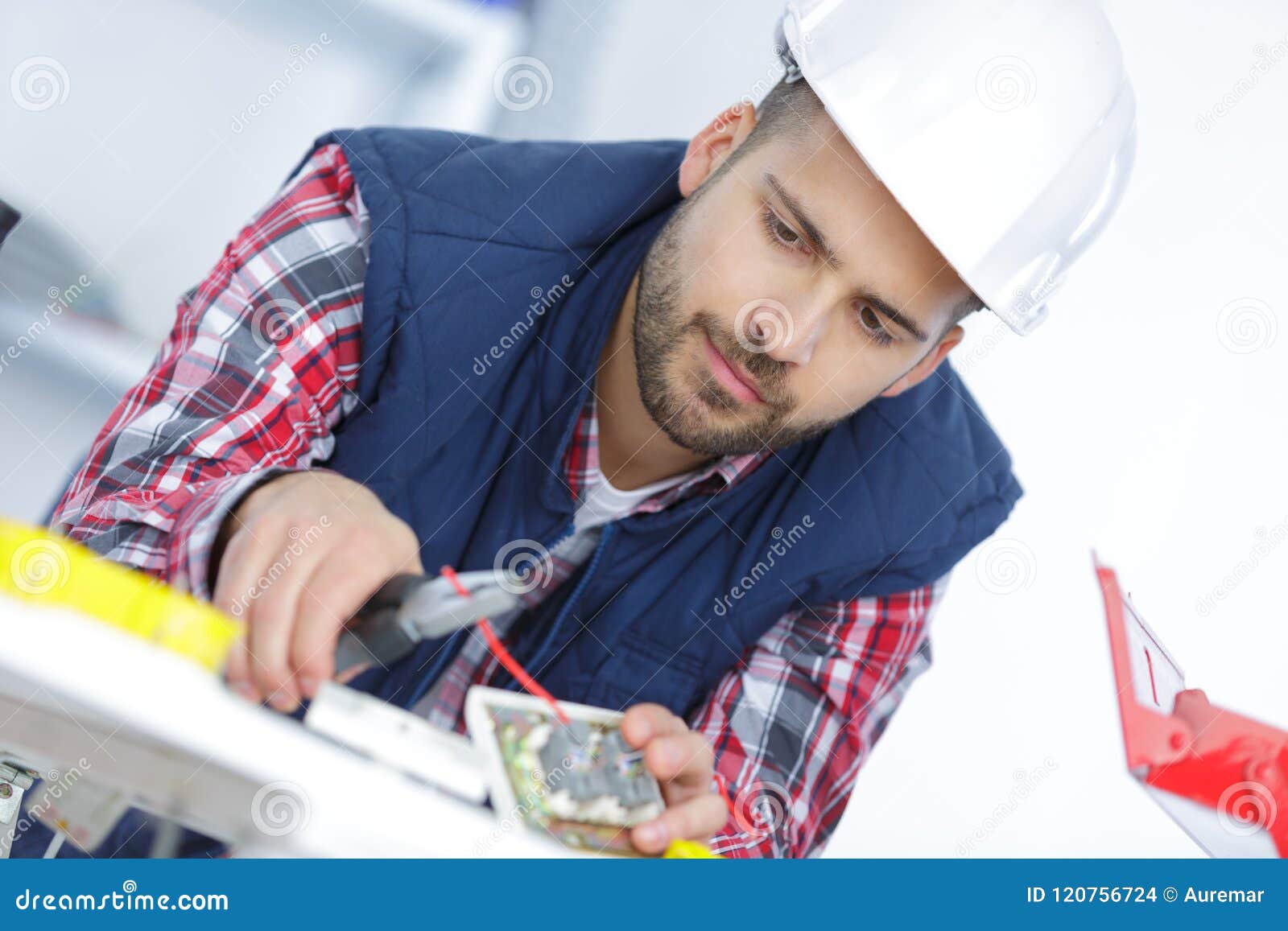 Electrician Cutting Wire with Pliers Stock Photo - Image of studio ...