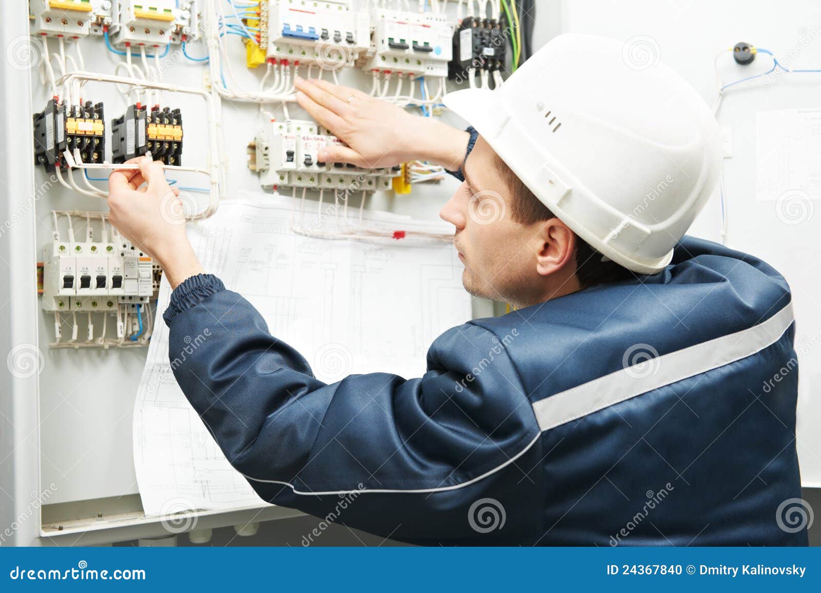 Electrician with Drawing at Power Line Box Stock Photo - Image of ...