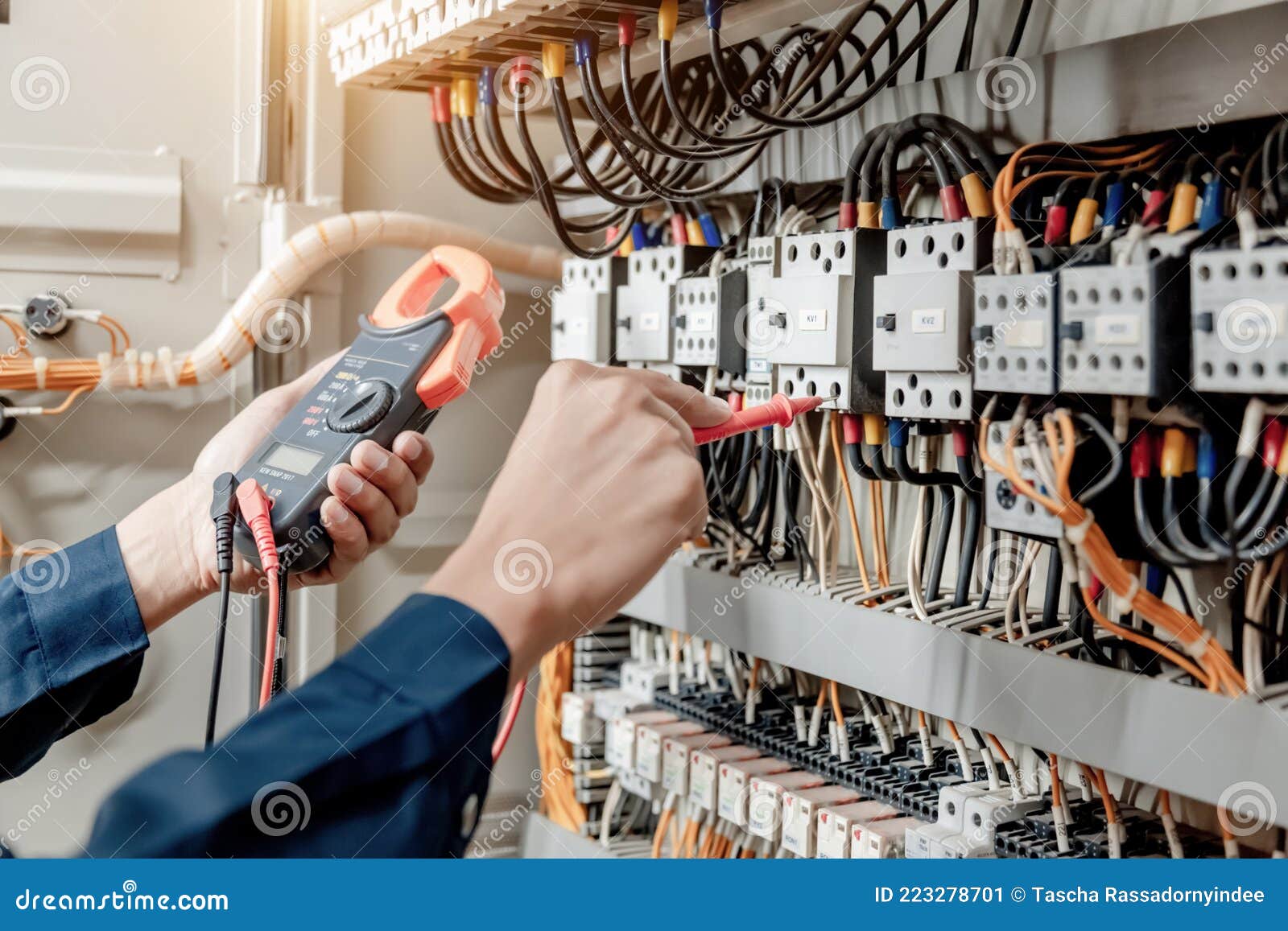 Electrician Engineer Uses a Multimeter To Test the Electrical ...