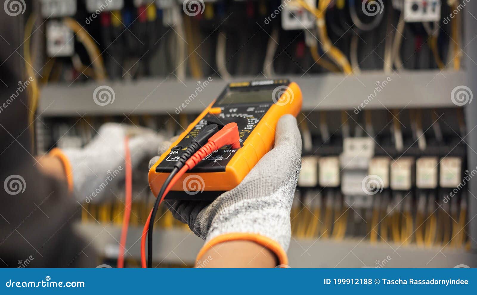 Electrician Engineer Uses a Multimeter To Test the Electrical ...