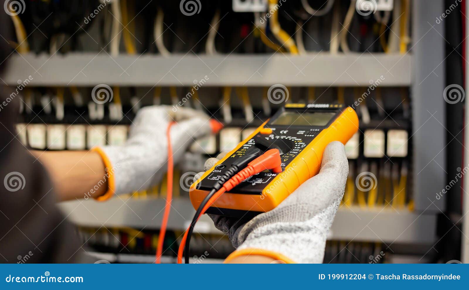Electrician Engineer Uses a Multimeter To Test the Electrical ...