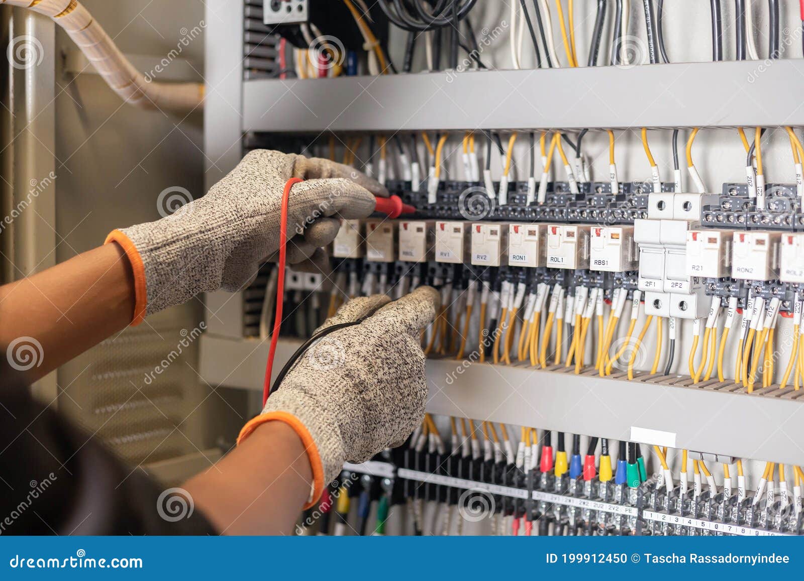 Electrician Engineer Uses a Multimeter To Test the Electrical ...