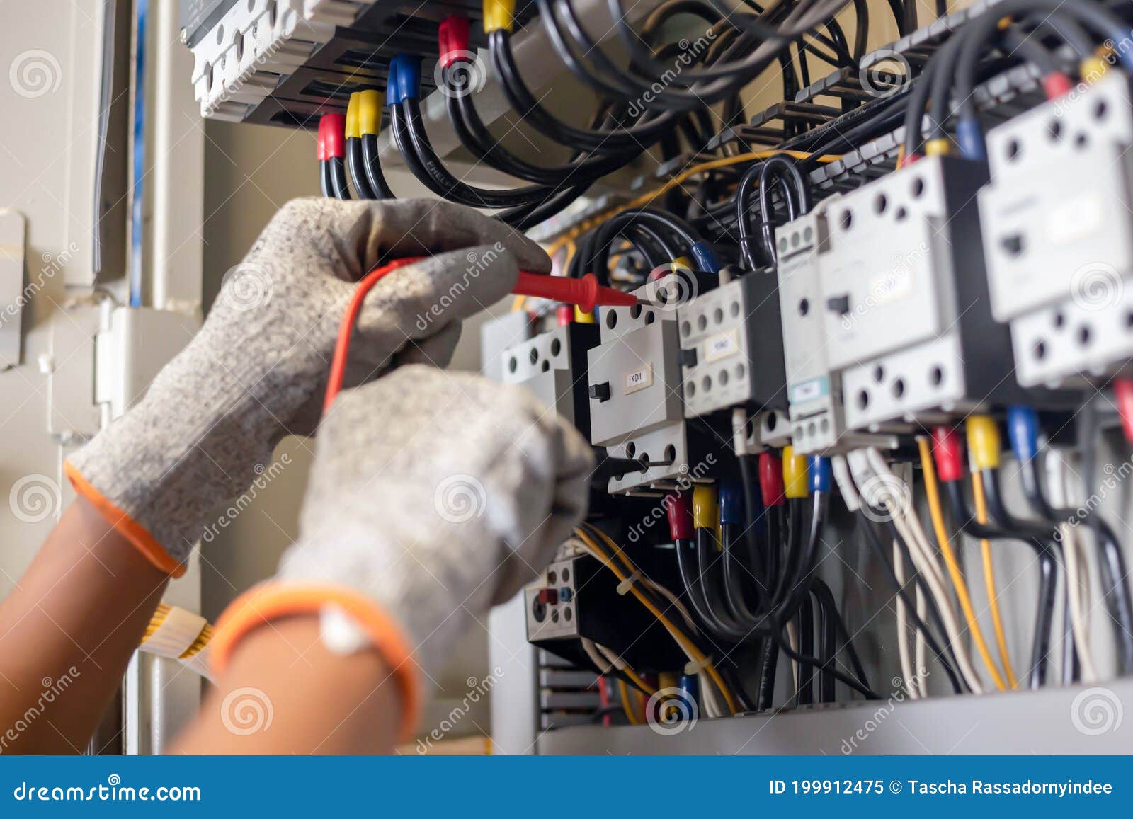 Electrician Engineer Uses a Multimeter To Test the Electrical ...