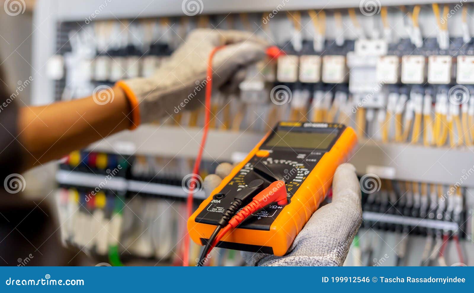 Electrician Engineer Uses a Multimeter To Test the Electrical ...