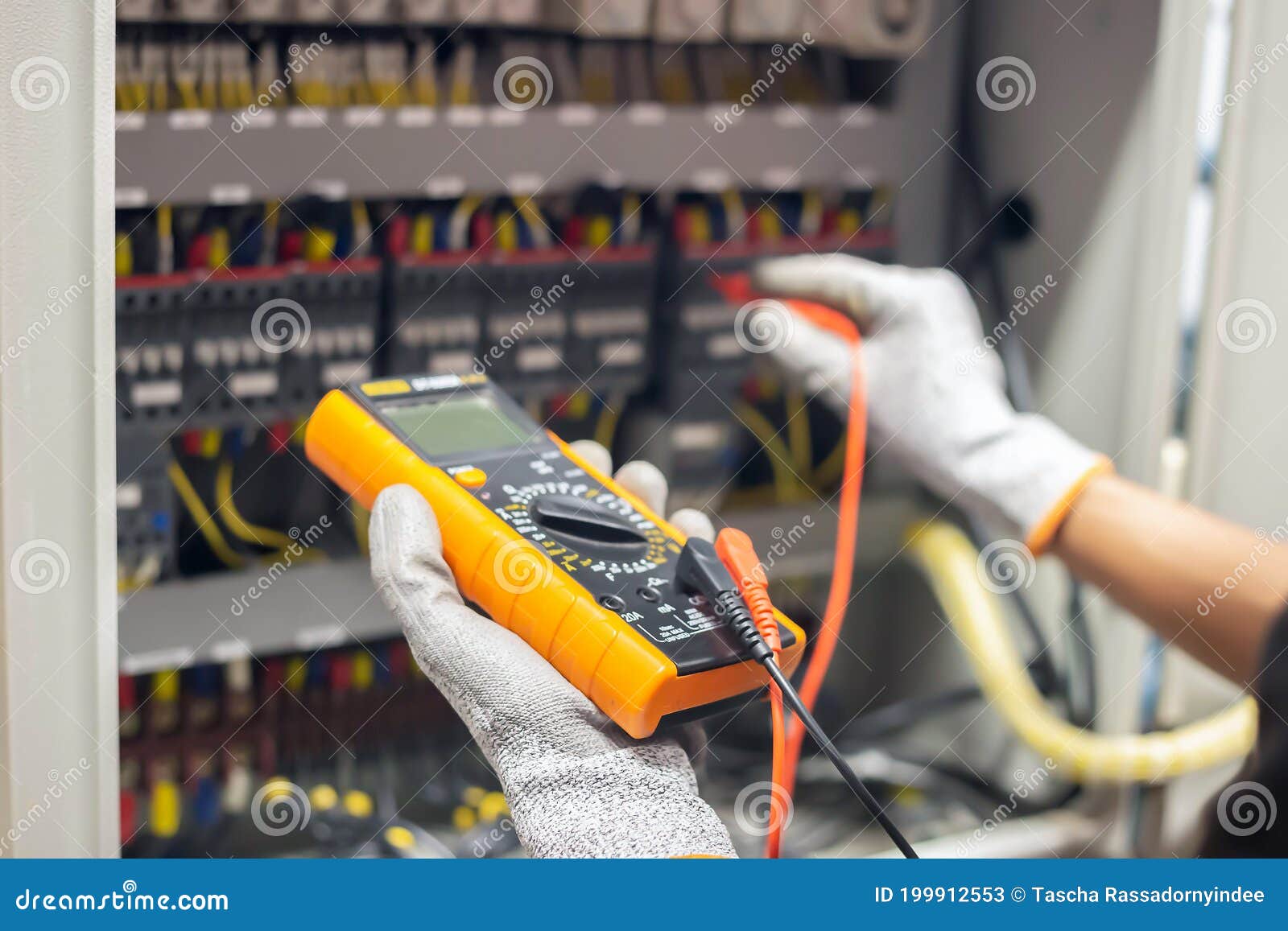 Electrician Engineer Uses a Multimeter To Test the Electrical ...