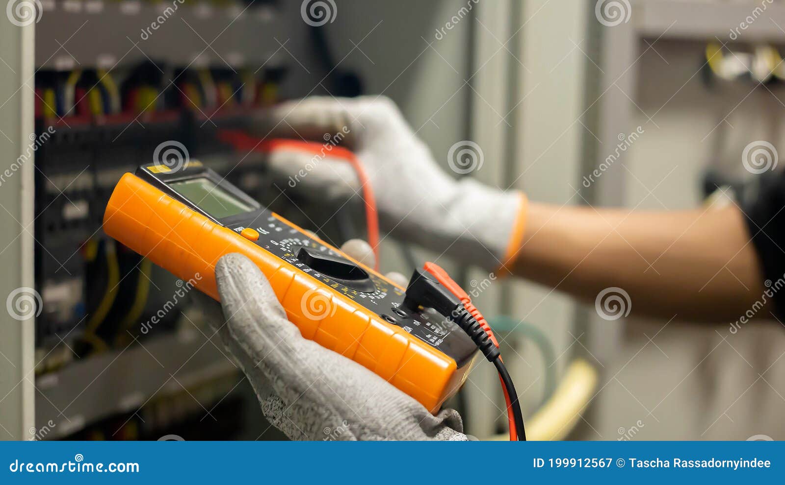 Electrician Engineer Uses a Multimeter To Test the Electrical ...