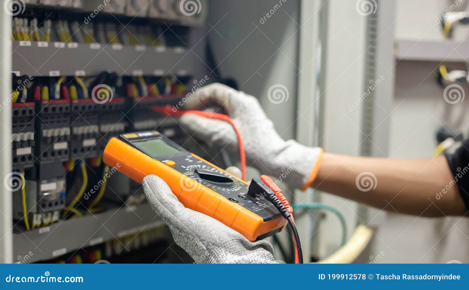 Electrician Engineer Uses a Multimeter To Test the Electrical ...