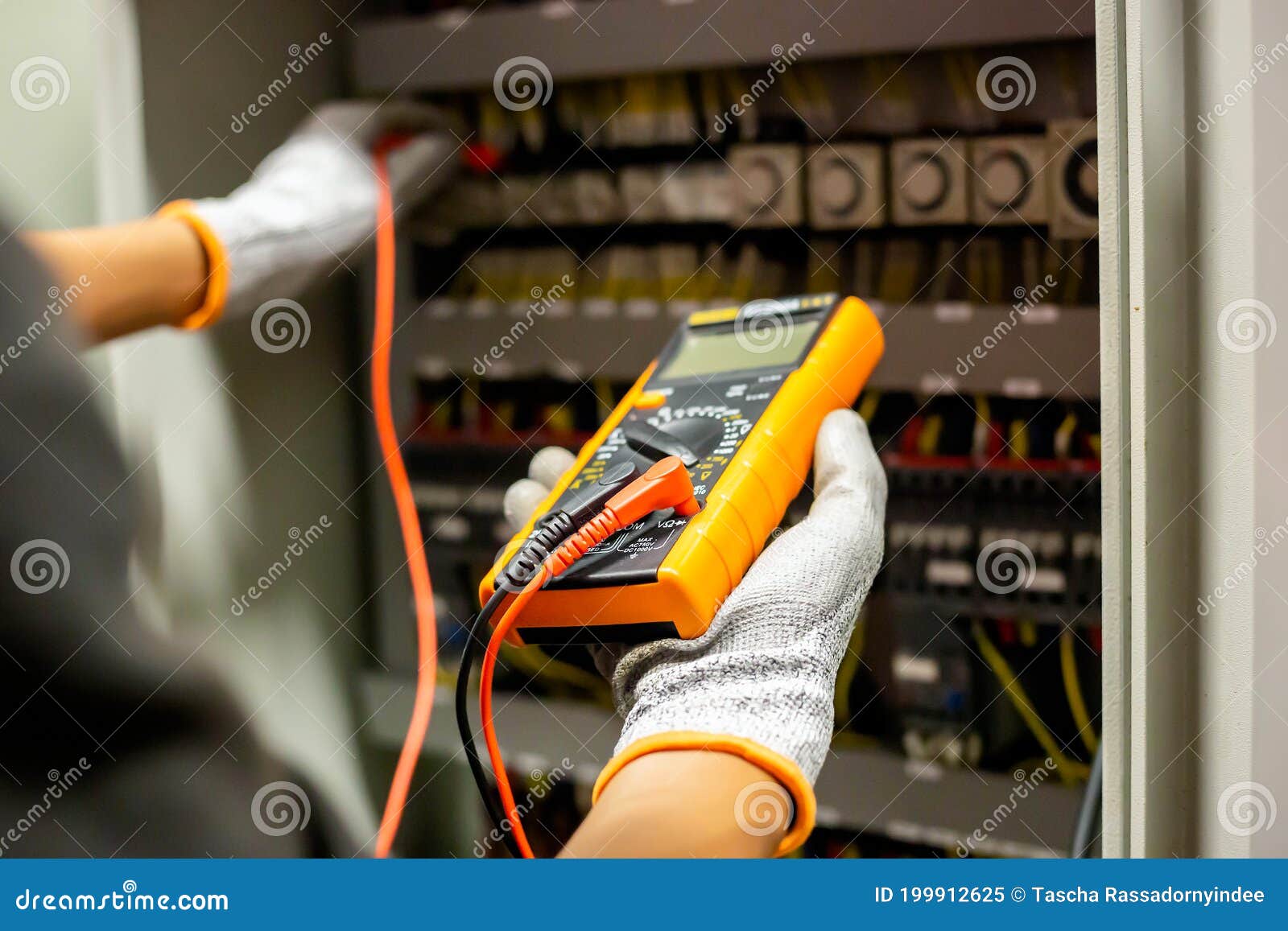 Electrician Engineer Uses a Multimeter To Test the Electrical ...