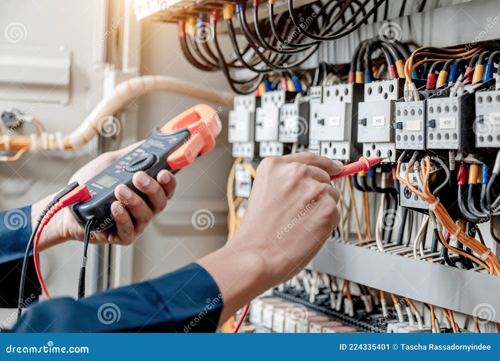 Electrician Engineer Uses a Multimeter To Test the Electrical ...