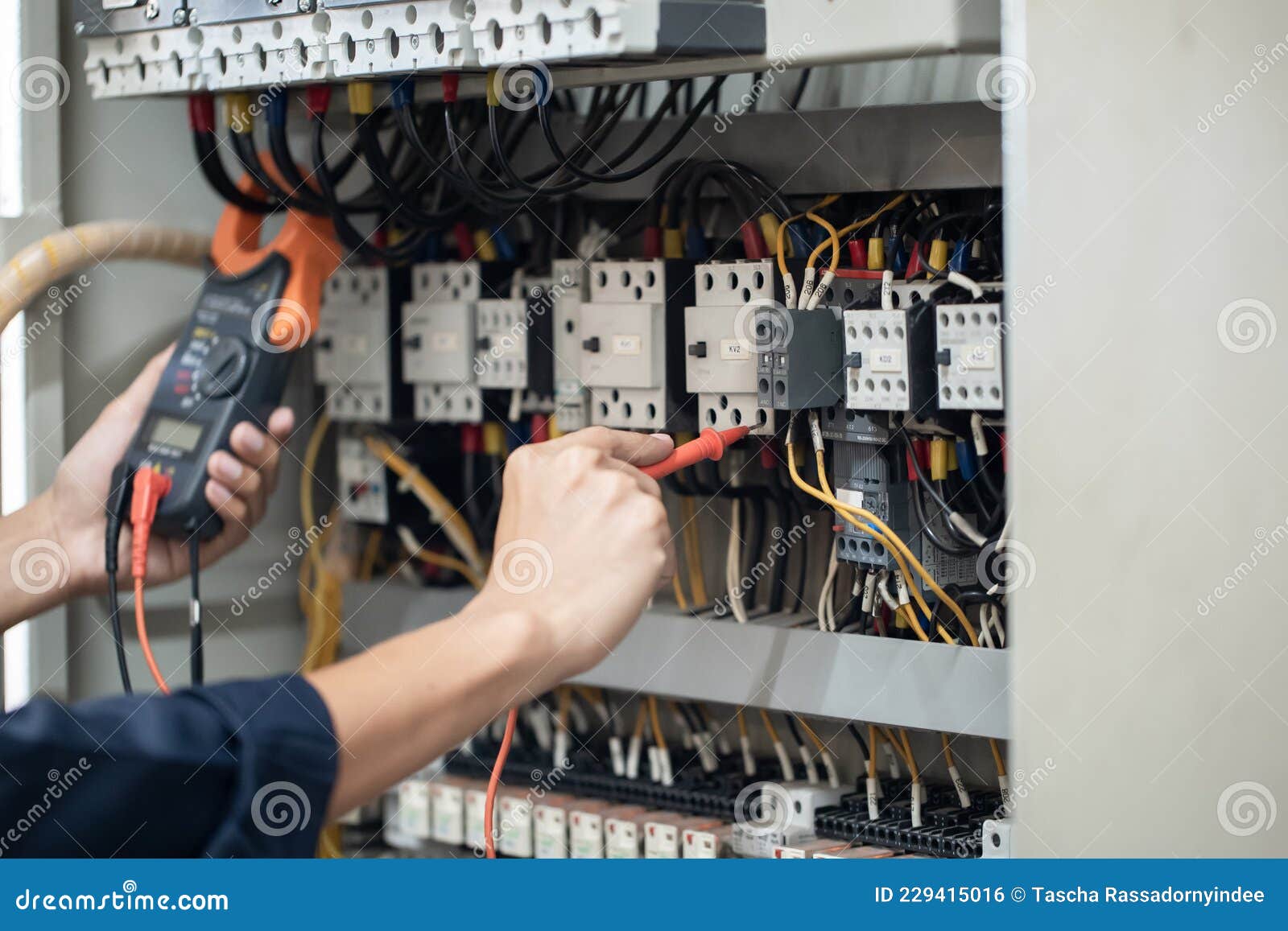 Electrician Engineer Work Tester Measuring Voltage and Current of Power ...