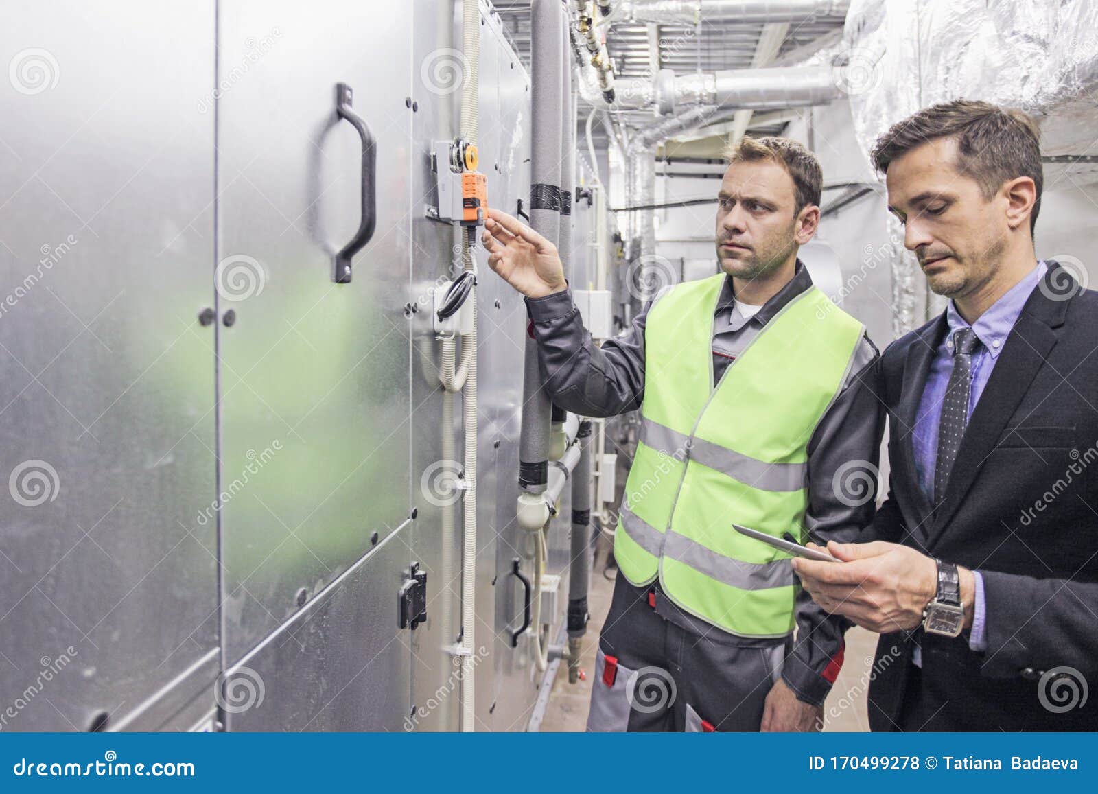 Electrician Engineers in Electrical Cabinet Control Stock Photo - Image ...