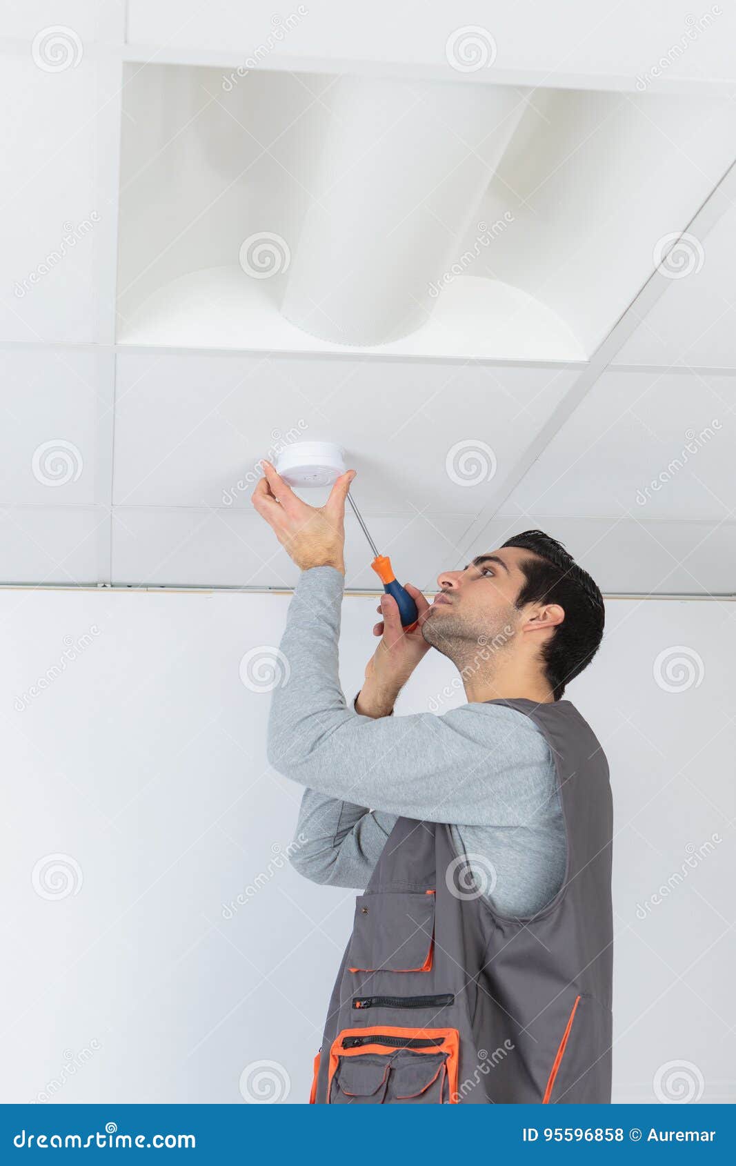 Electrician with Fire Detector Stock Photo - Image of handyman, builder ...