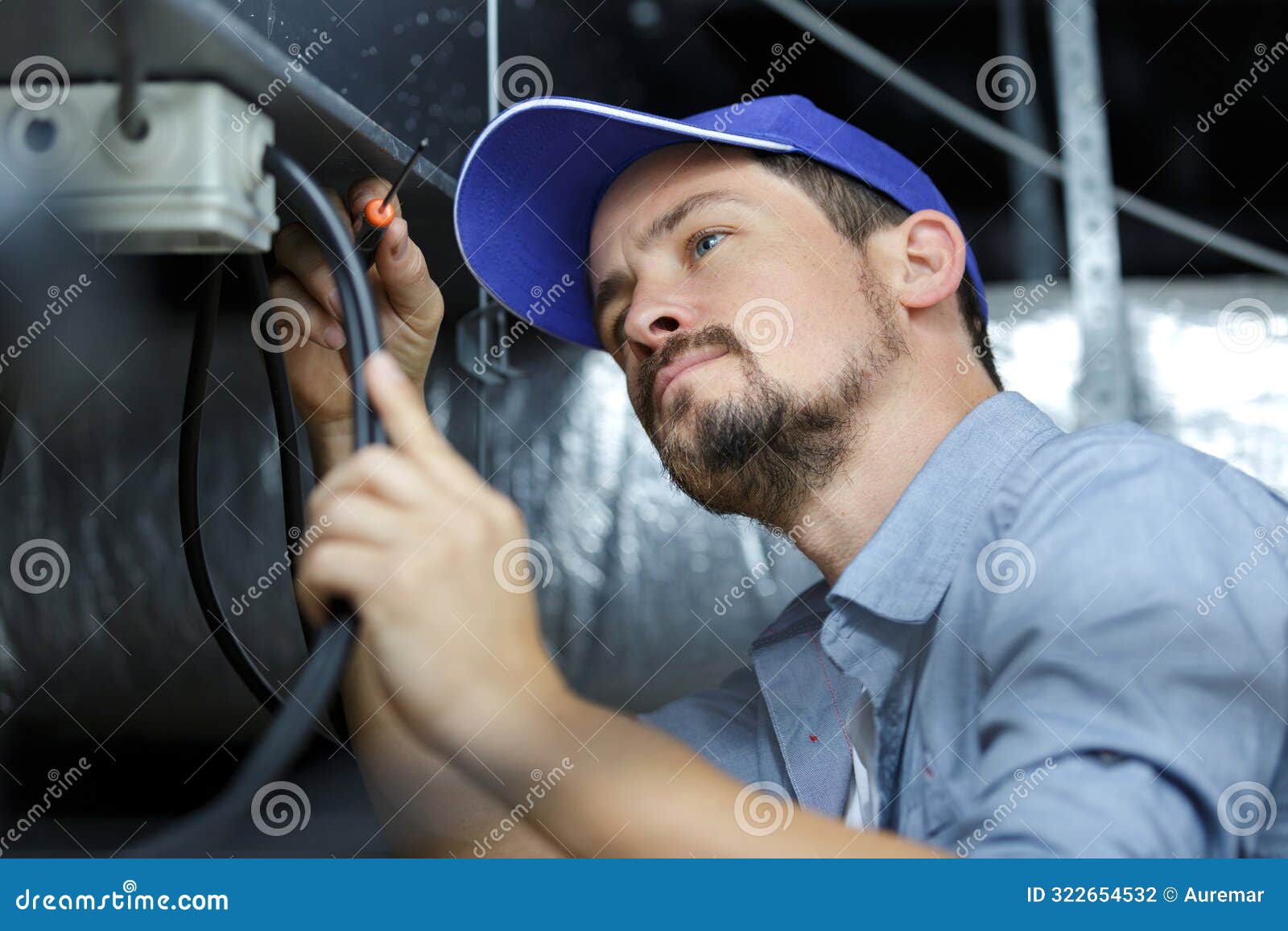 Electrician Fixing Electric Cable Stock Photo - Image of electric, mess ...