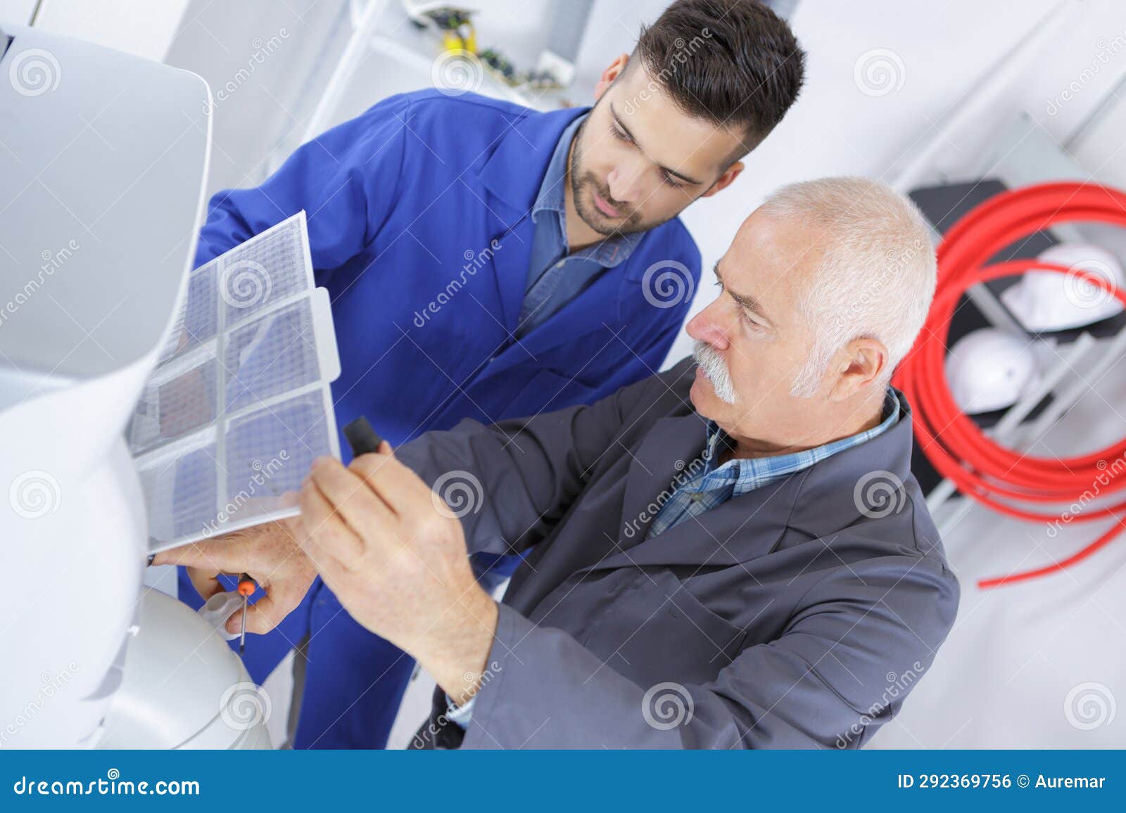 Electrician Fixing Electrical Devices with Different Tools Stock Photo ...