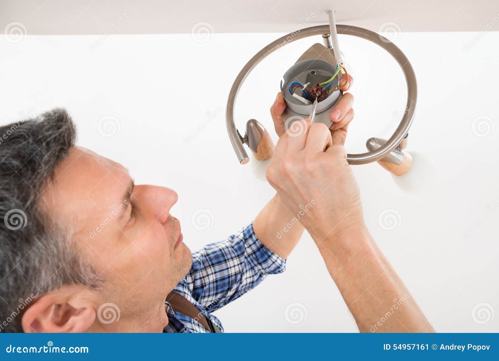 Electrician Fixing Light on Ceiling Stock Image - Image of close ...