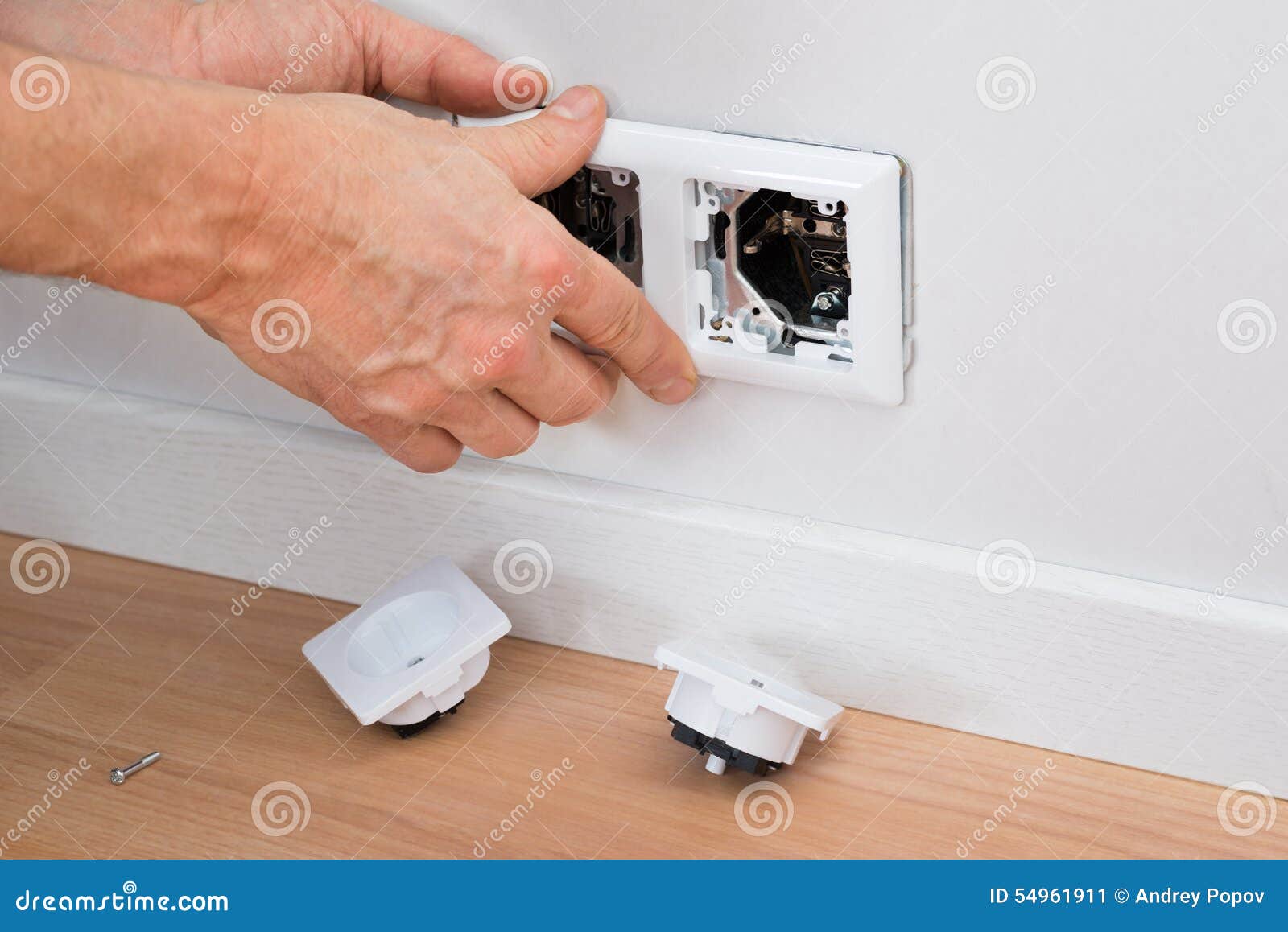 Electrician fixing socket stock image. Image of fixing - 54961911