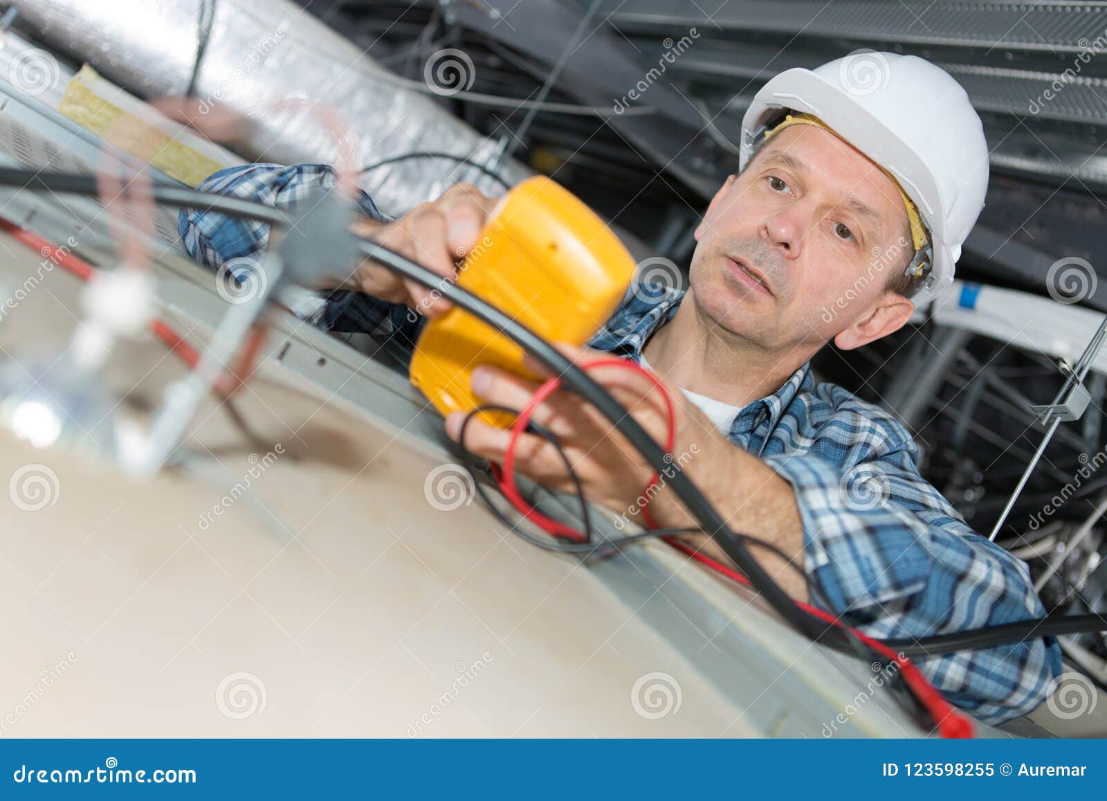 An Electrician Fixing Wires Stock Image - Image of precision, repair ...