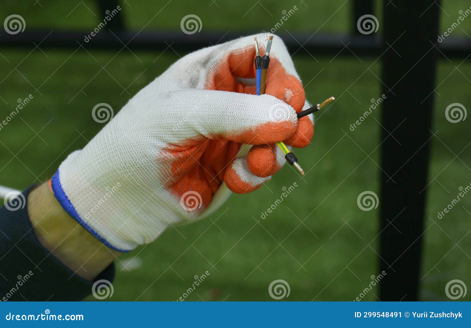 Electrician Hand Holding Stripped Wire Connections To Join Them Stock ...