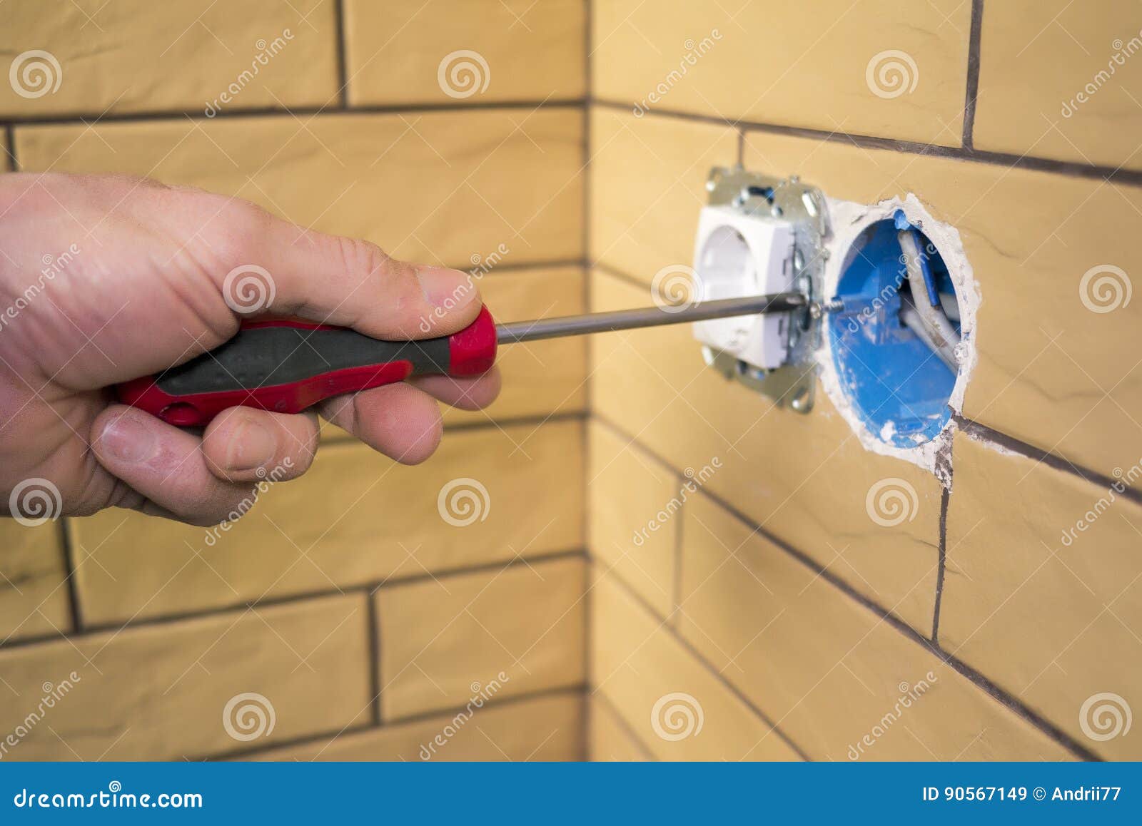 Electrician Hand With Screwdriver Installing Socket Royalty-Free Stock ...