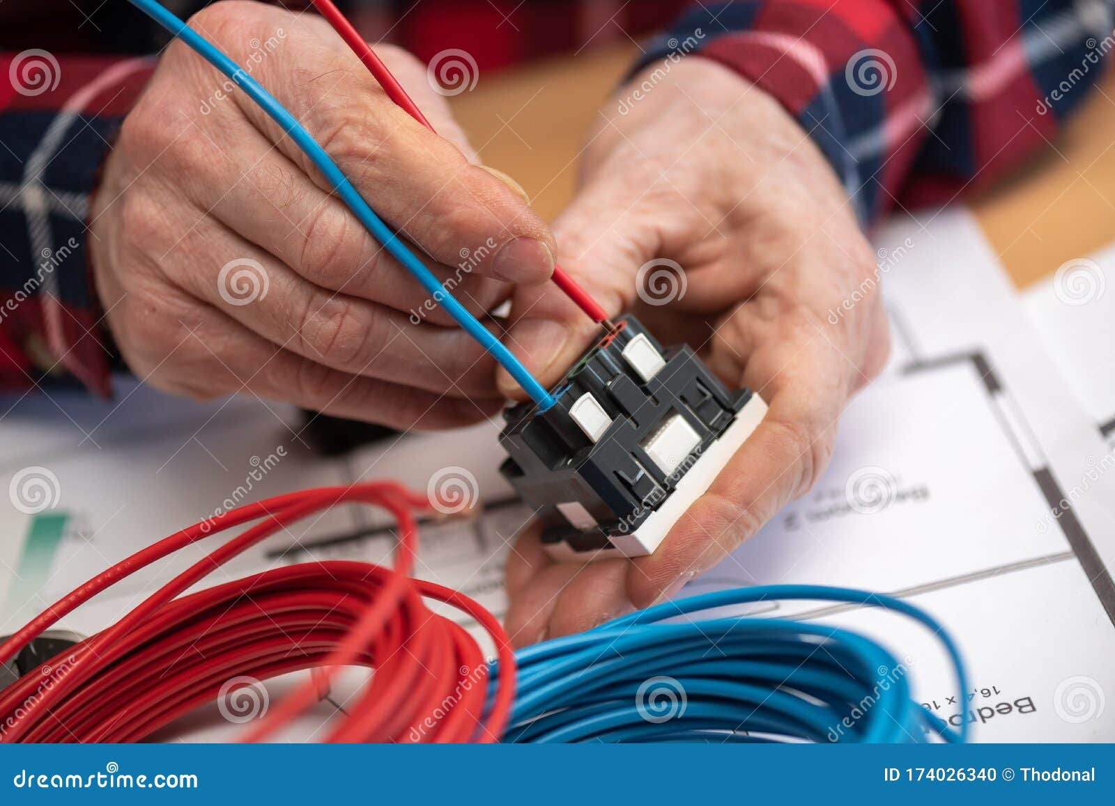 Electrician Connecting a Wire into a Power Socket Stock Photo - Image ...