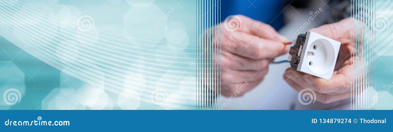 Electrician Connecting a Wire into a Power Socket. Panoramic Banner ...