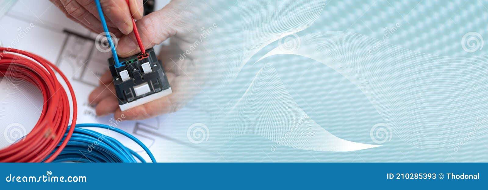 Electrician Connecting a Wire into a Power Socket; Panoramic Banner ...