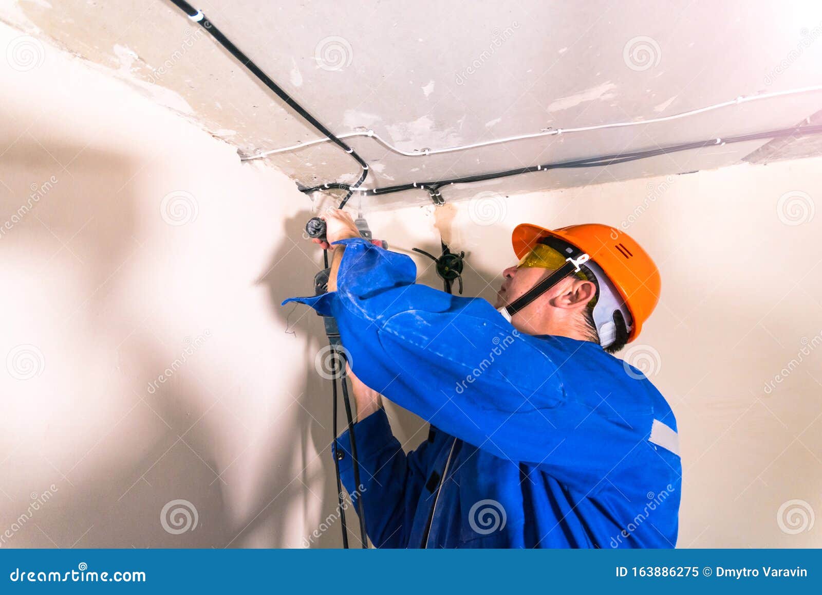 Electrician in Hard Hat and Uniform Stock Image - Image of hard ...