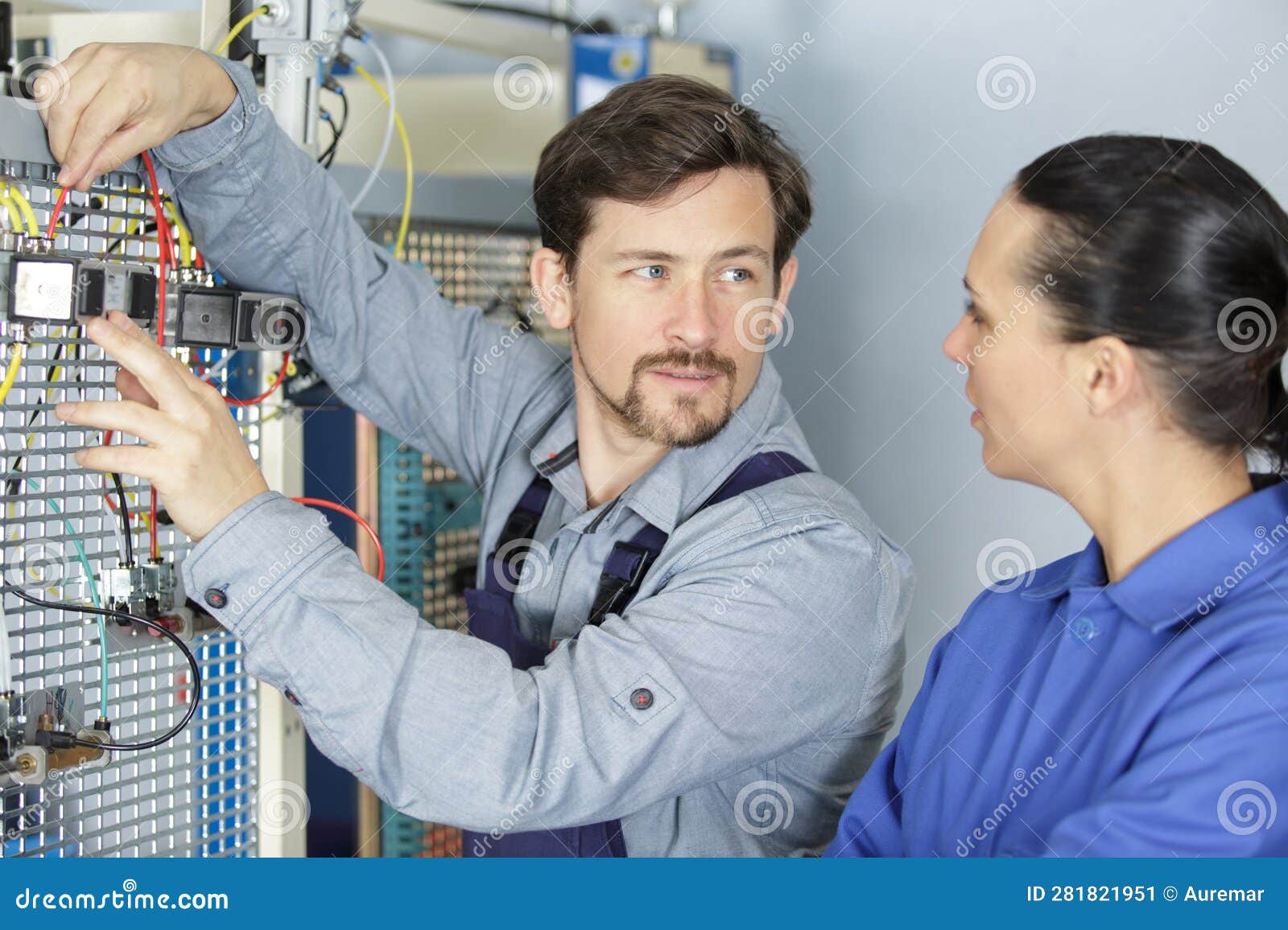 Electrician and Apprentice at Work Stock Image - Image of safety ...