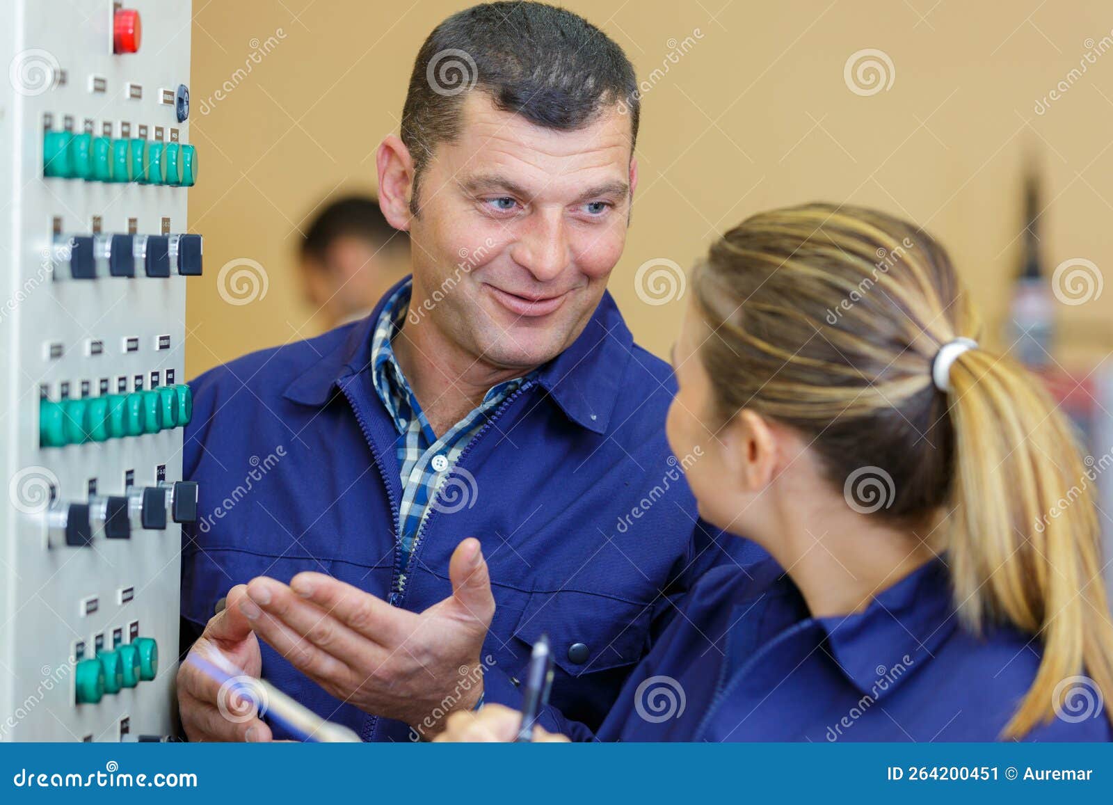 Electrician and Apprentice Working in Factory Stock Image - Image of ...