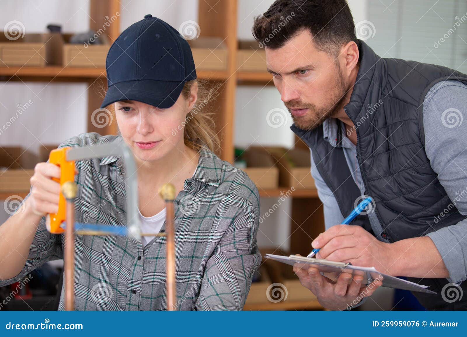 Electrician and Female Apprentice Stock Photo - Image of trainee ...