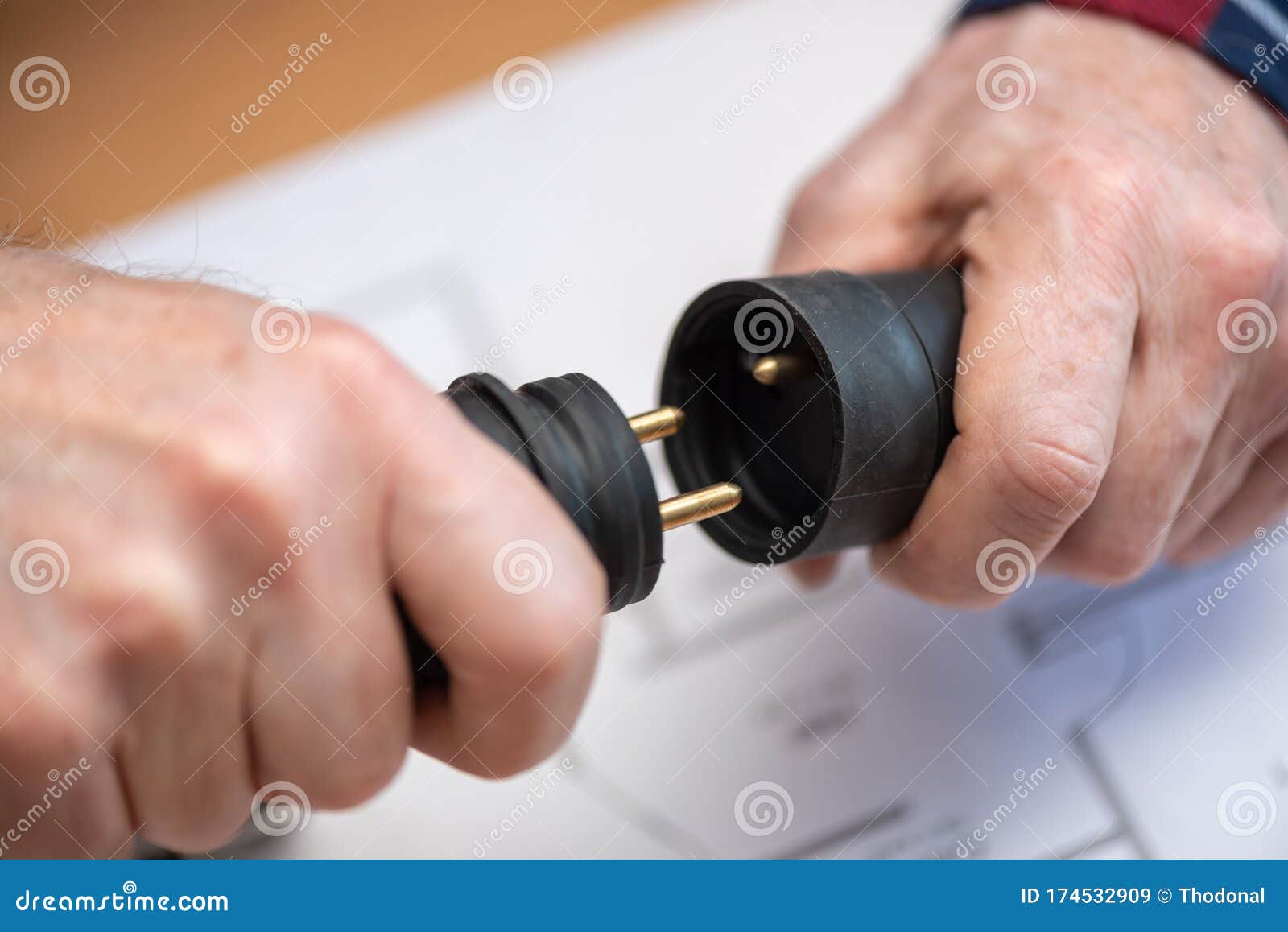 Electrician Holding Electrical Plugs Stock Image - Image of connecting ...