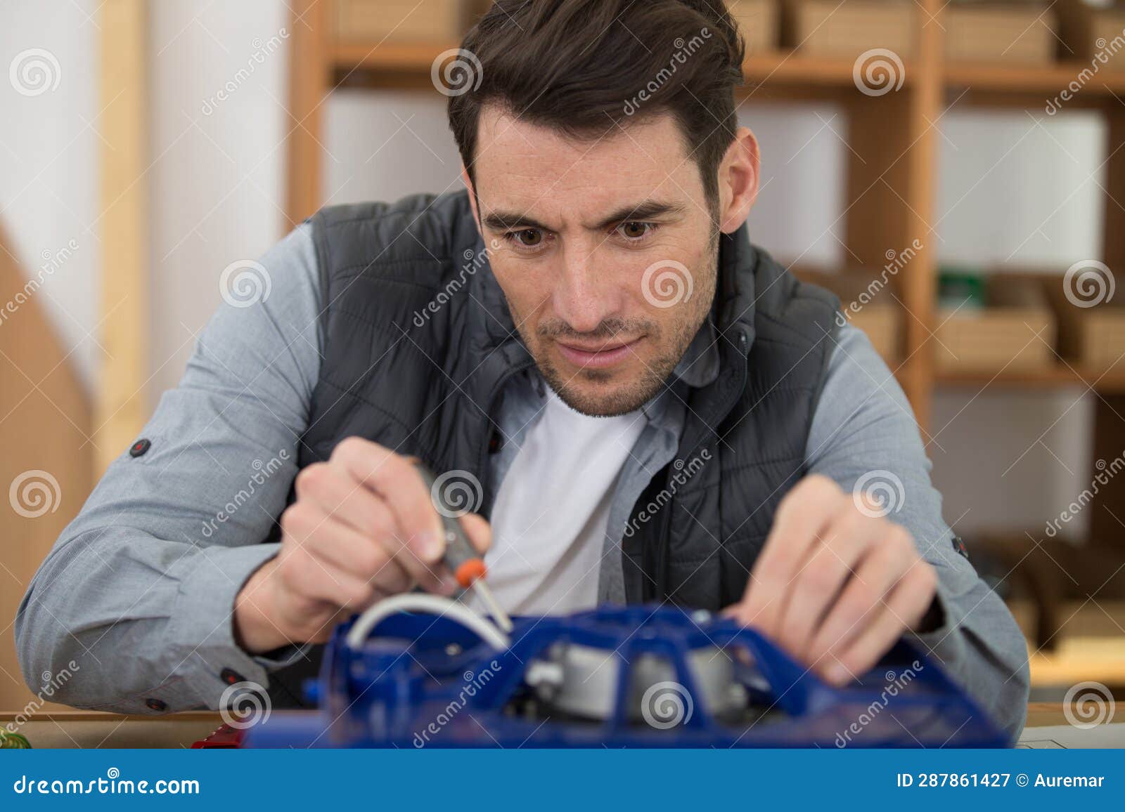 Electrician Ing Workshop Working on Electrical Unit with Screwdriver ...