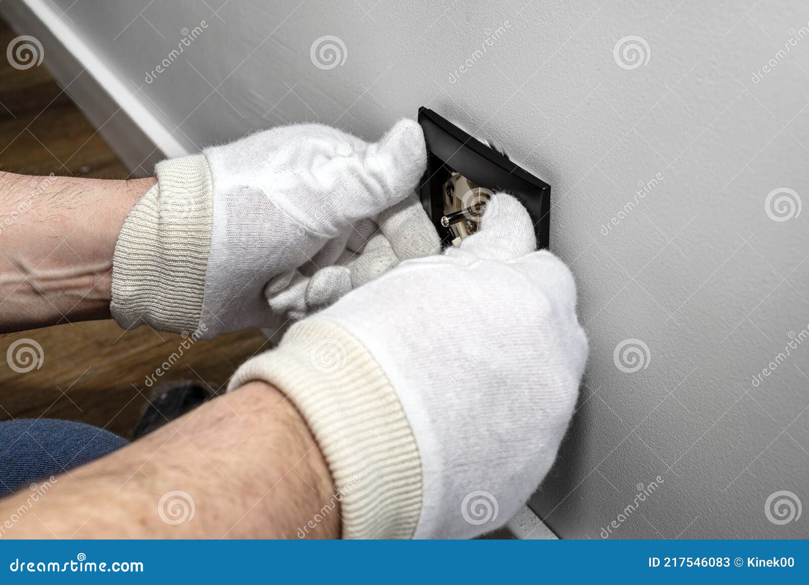 An Electrician Inserts a Black Frame from a Electric Socket with Double ...