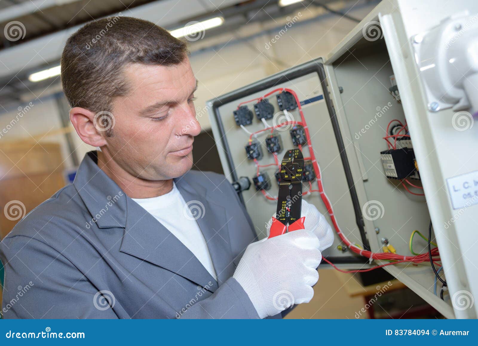Electrician Installing Electrical Panel Stock Photo - Image of pliers ...