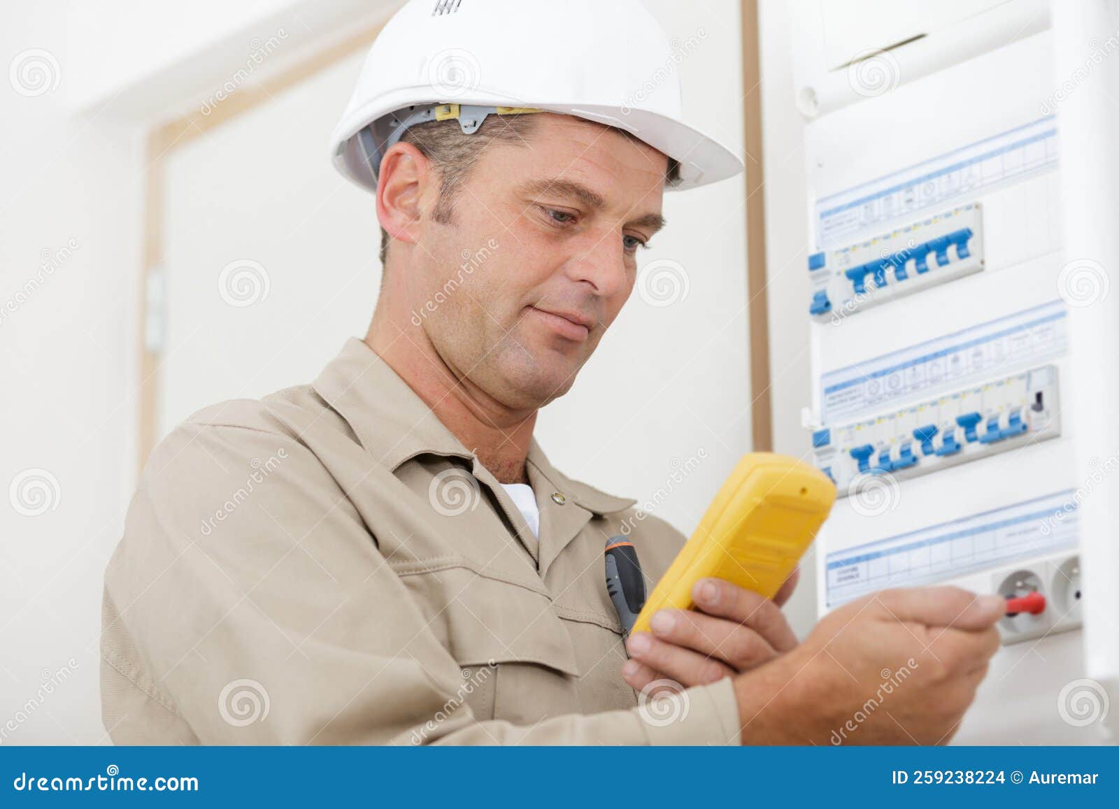 Electrician Installing Energy Saving Meter Stock Photo - Image of ...