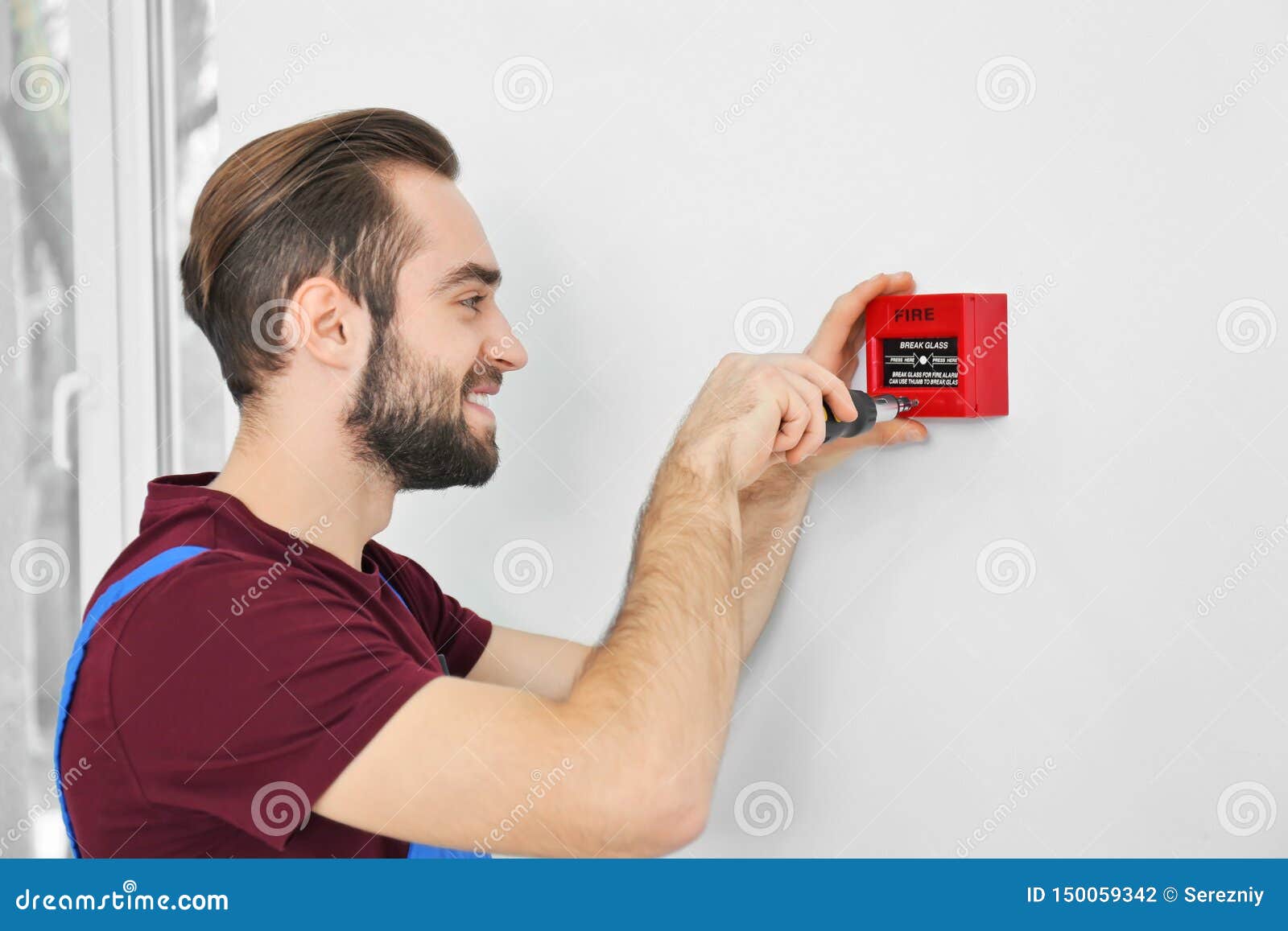 Electrician Installing Fire Alarm System Stock Photo - Image of person ...