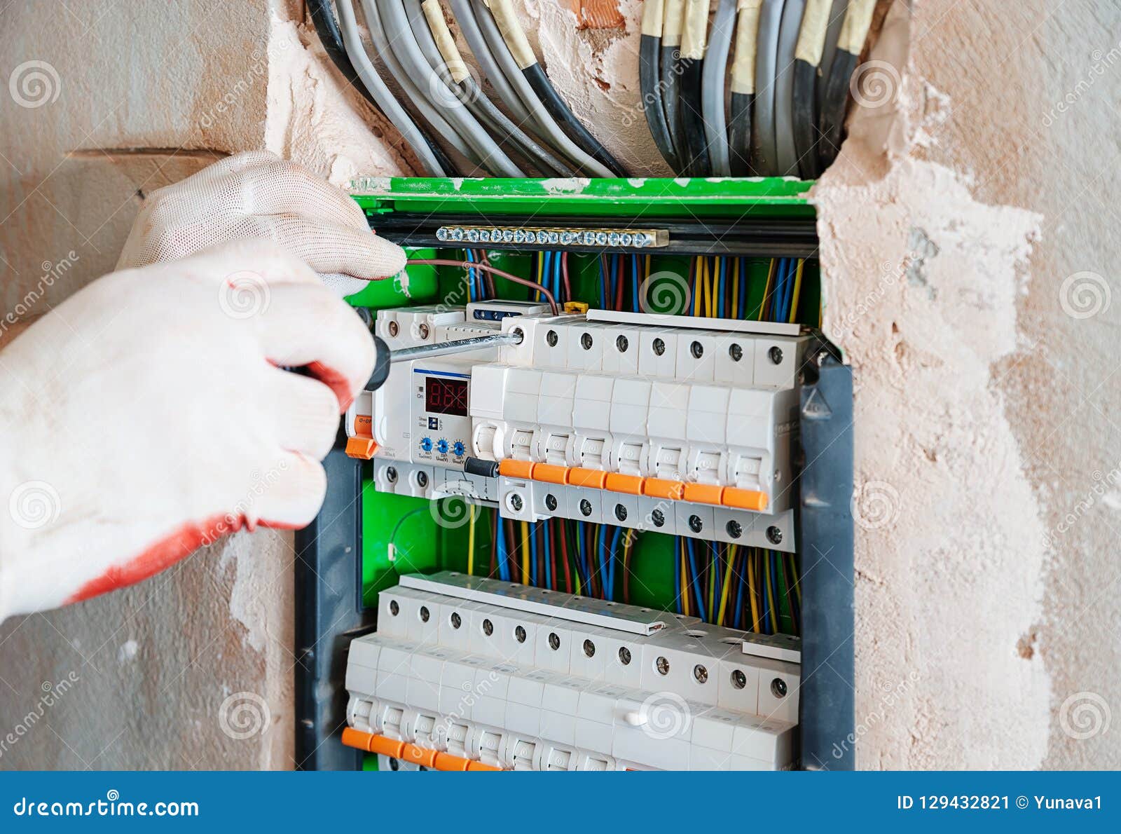 A Electrician is Installing the Fuses. Stock Image - Image of ...