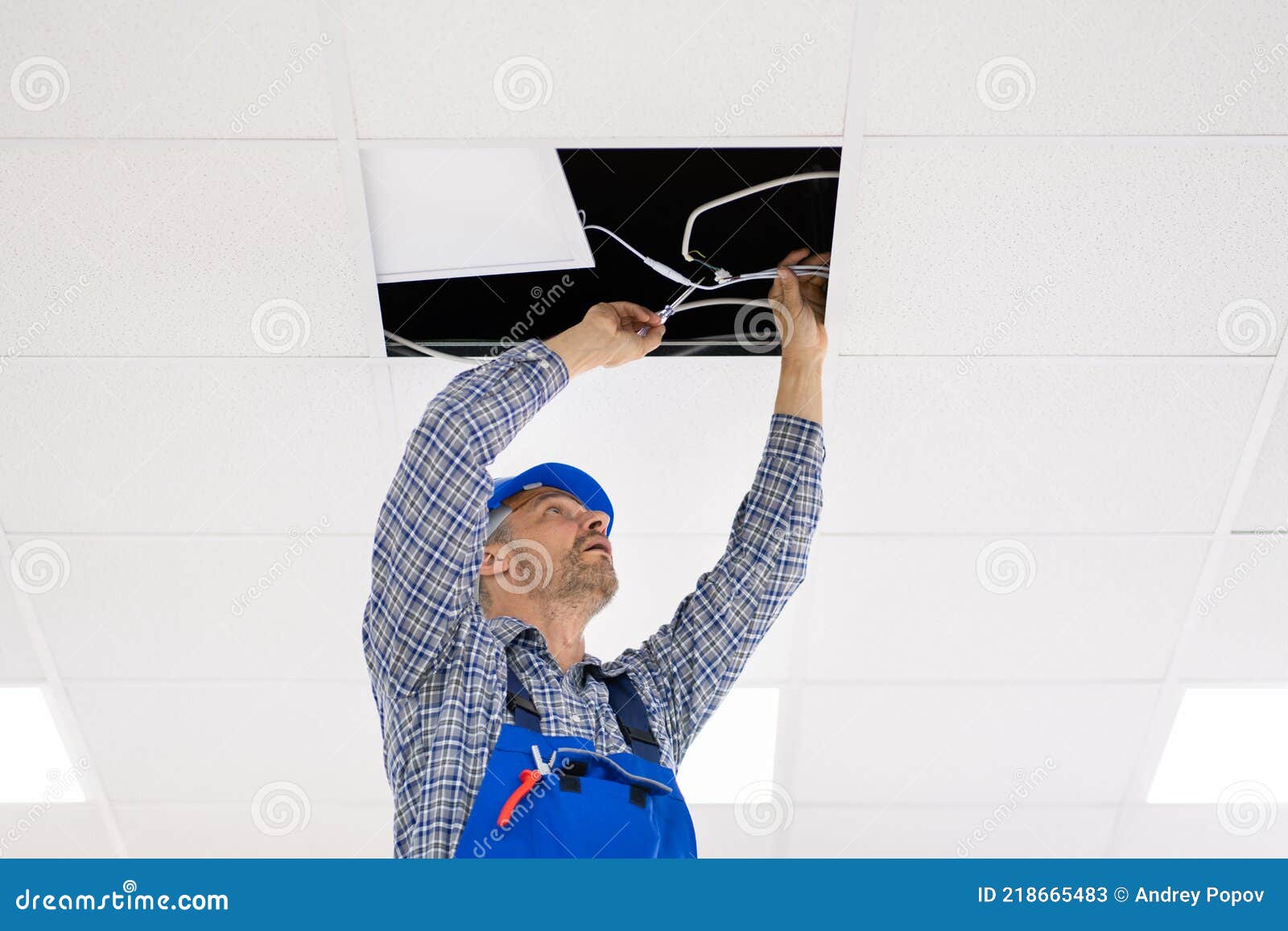 Electrician Installing LED Ceiling Light Stock Image - Image of ...