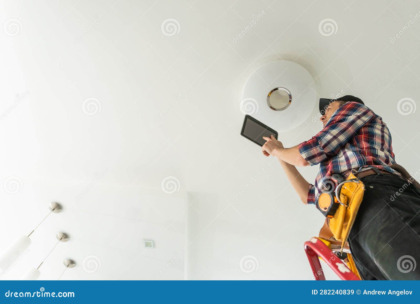 Electrician Installing Led Light Bulbs in Ceiling Lamp Stock Image ...