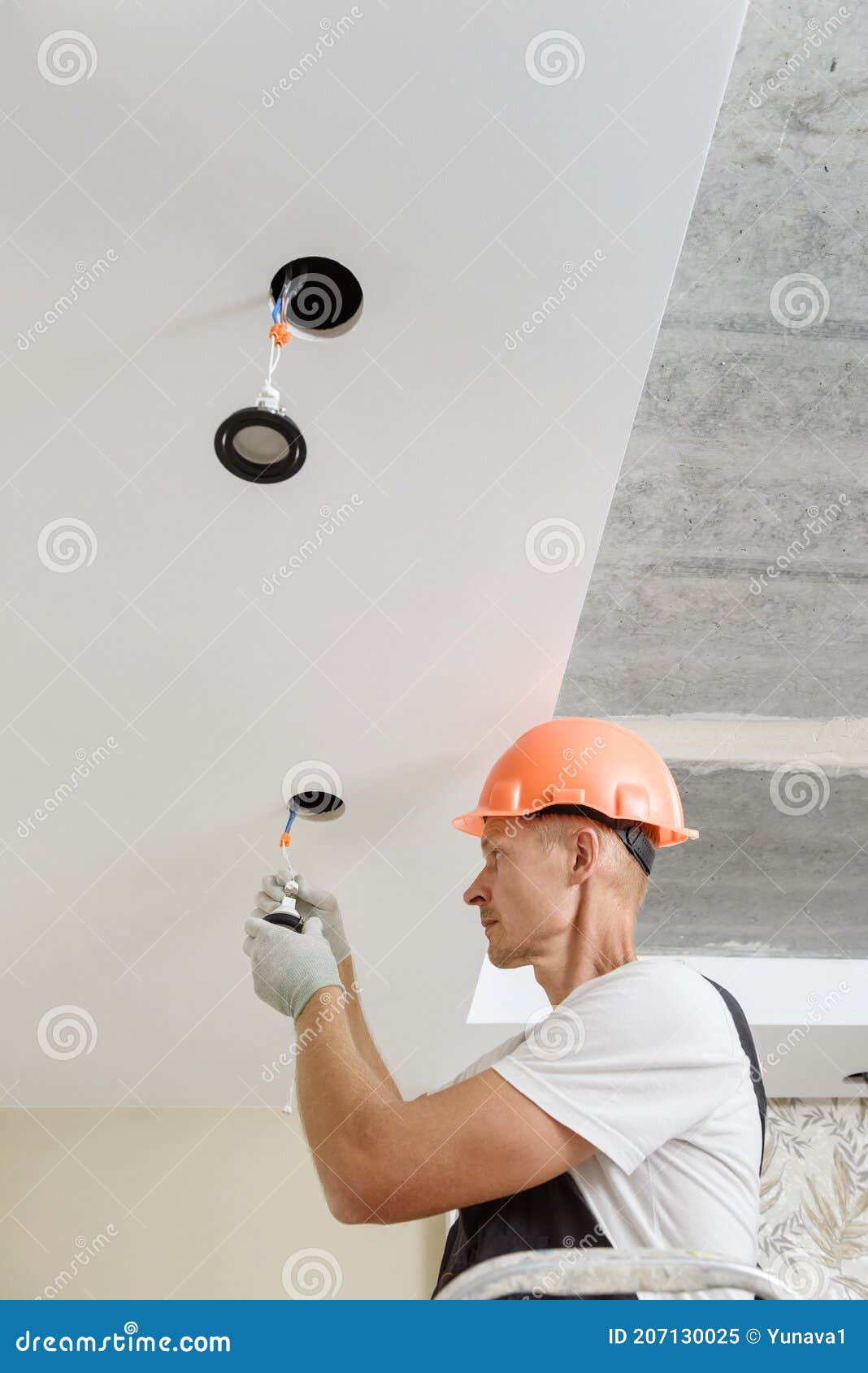 The Electrician is Installing LED Spotlights Stock Image - Image of ...