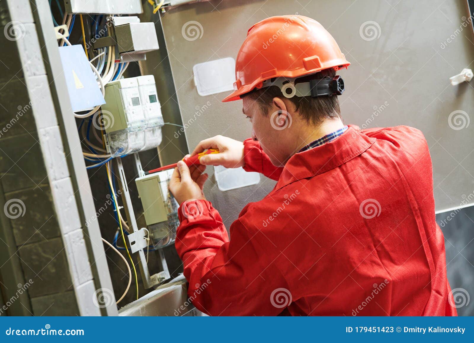Electrician Installing or Repairing Energy Saving Meter. Maintenance ...