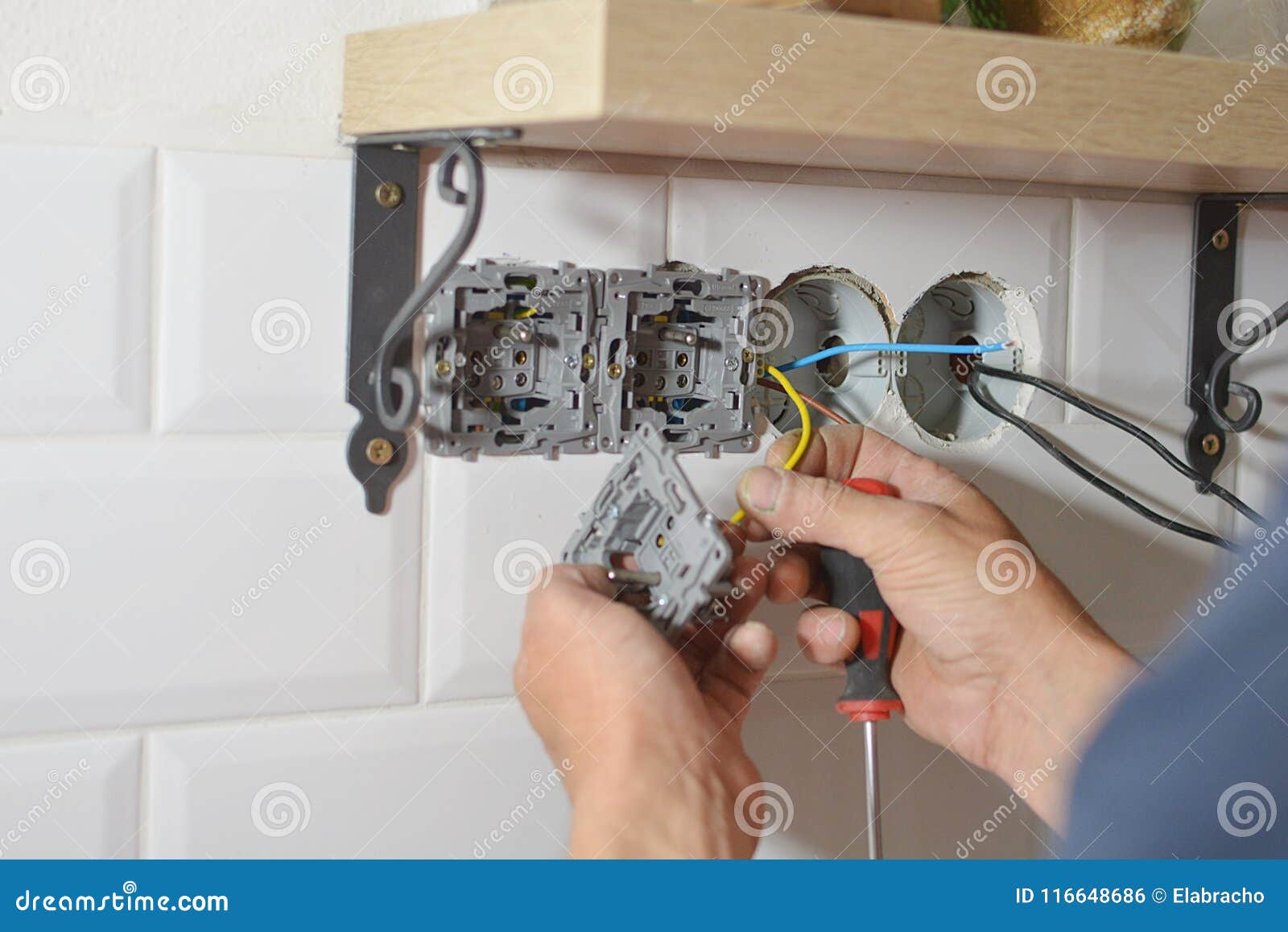Electrician Installing Wall Socket Stock Photo - Image of indoors ...