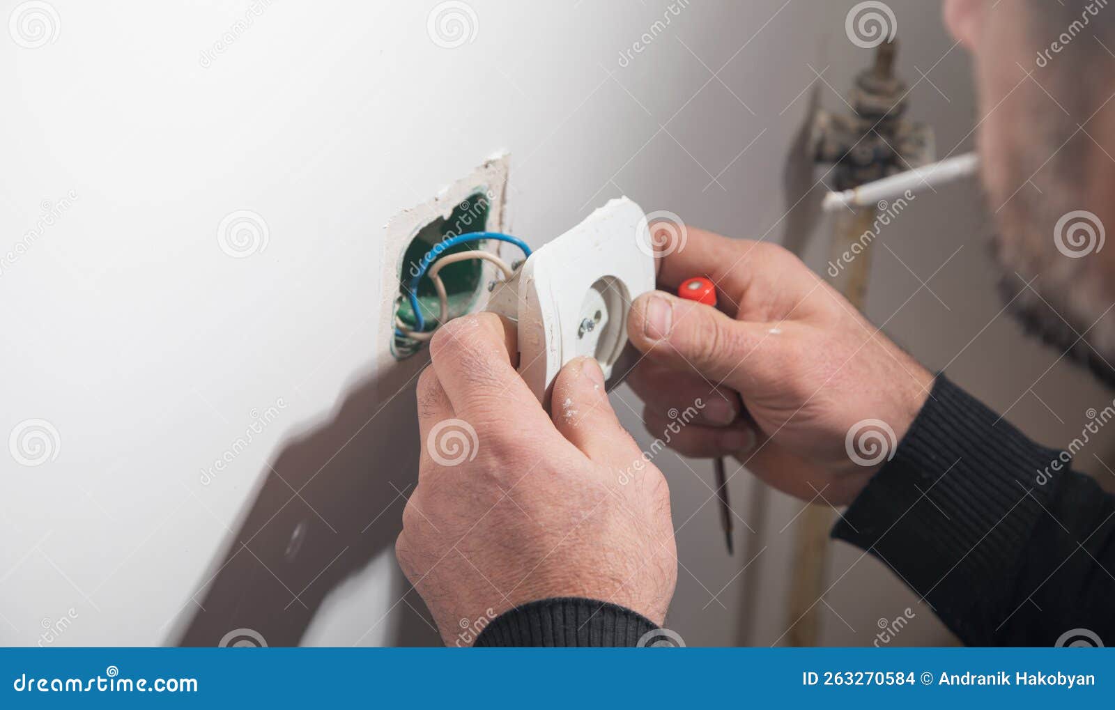 Electrician Installing a Wall Socket at Home Stock Photo - Image of ...