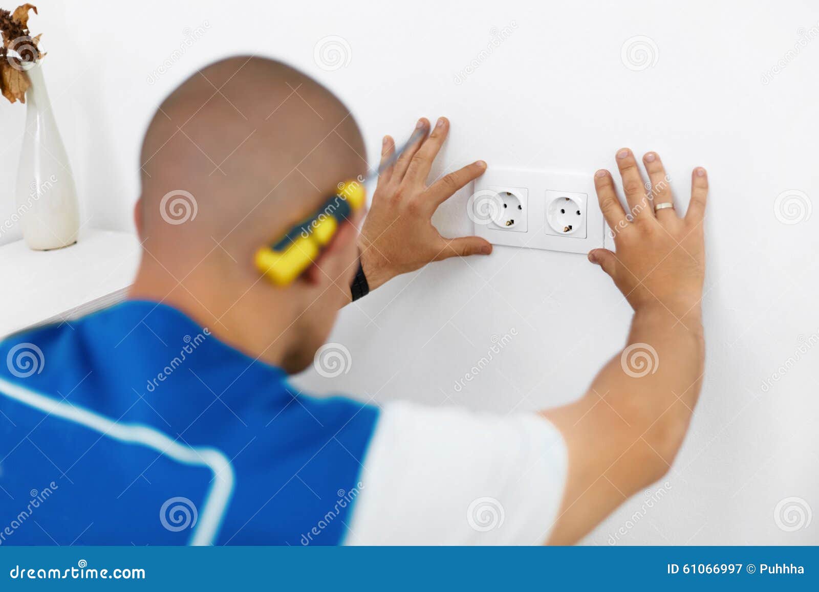 Installing New Wall Plug Stock Image | CartoonDealer.com #144342529