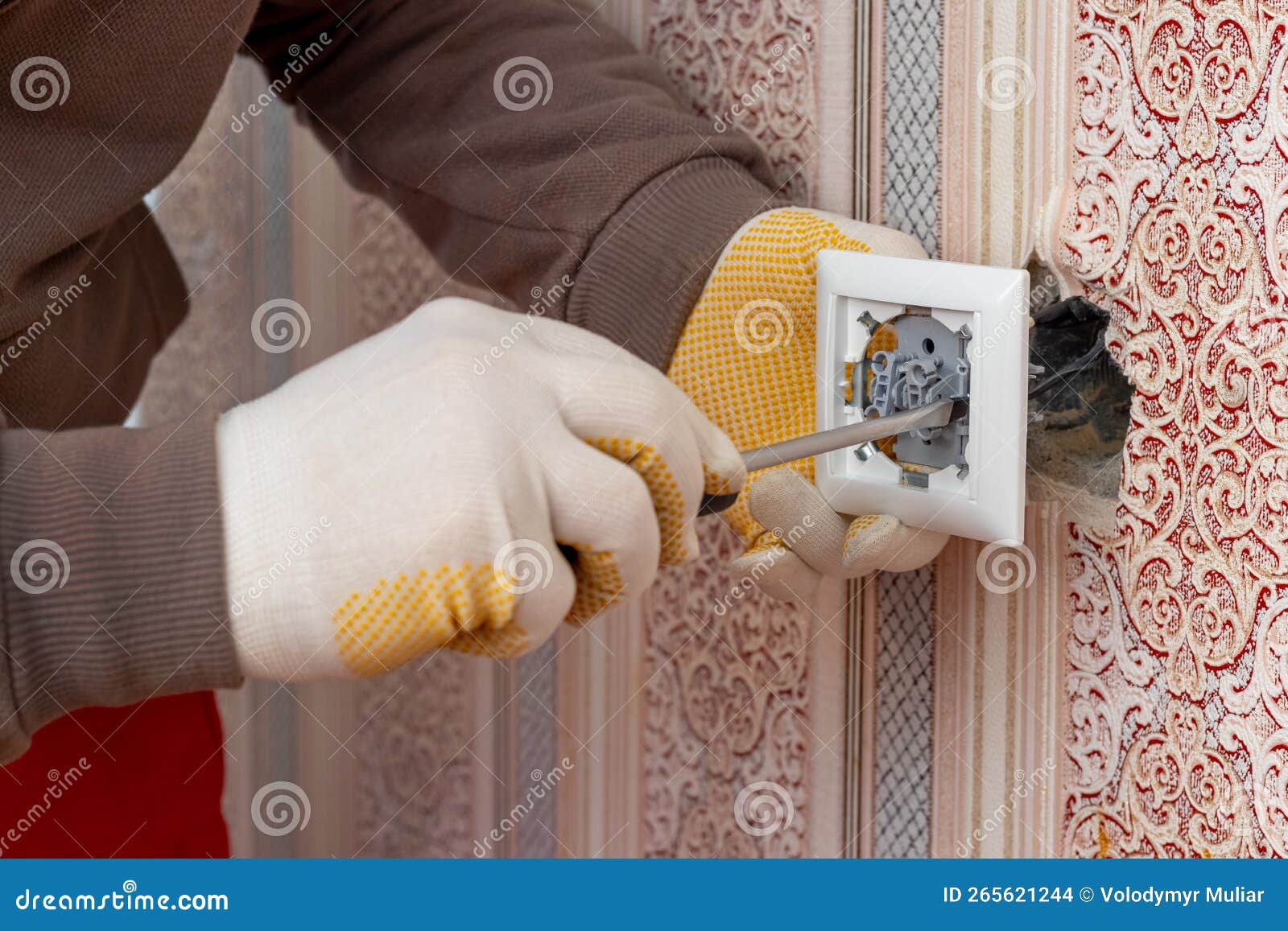An Electrician Installs a Switch in a Private House Stock Photo - Image ...