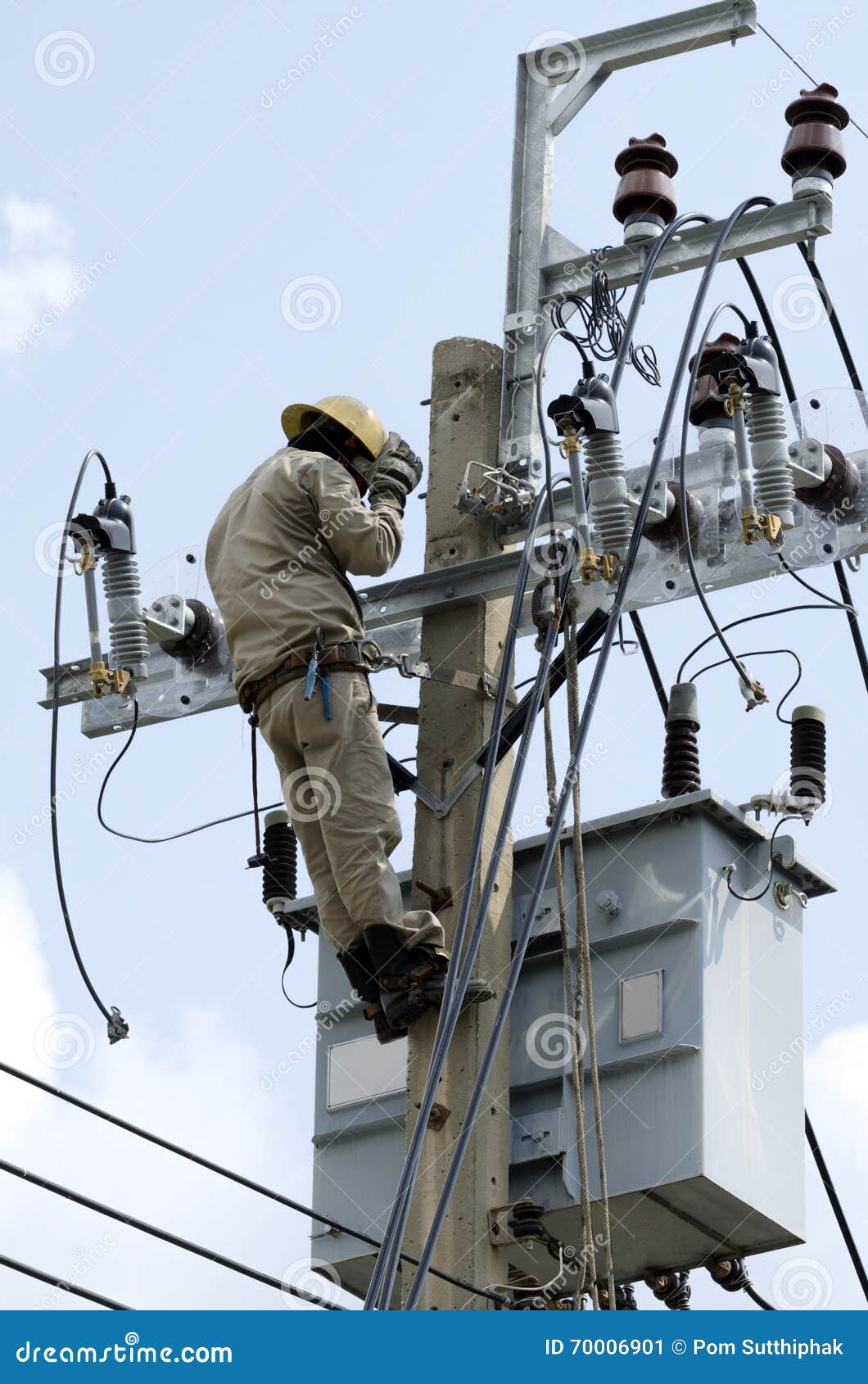Electrician Lineman Repairman Worker At Climbing Work On Electric Post ...