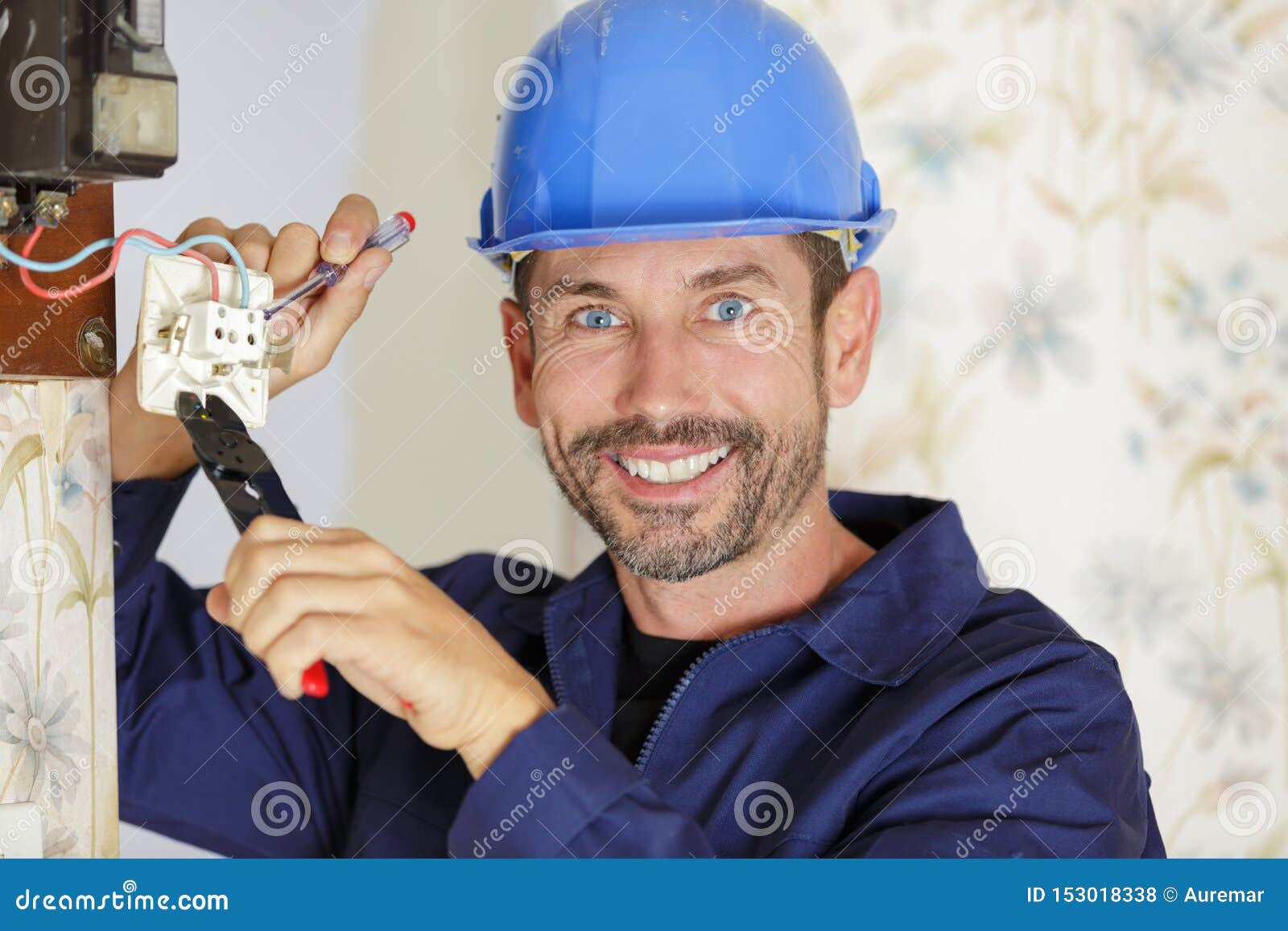 Electrician Looks at Camera Stock Photo - Image of handyman, equipment ...