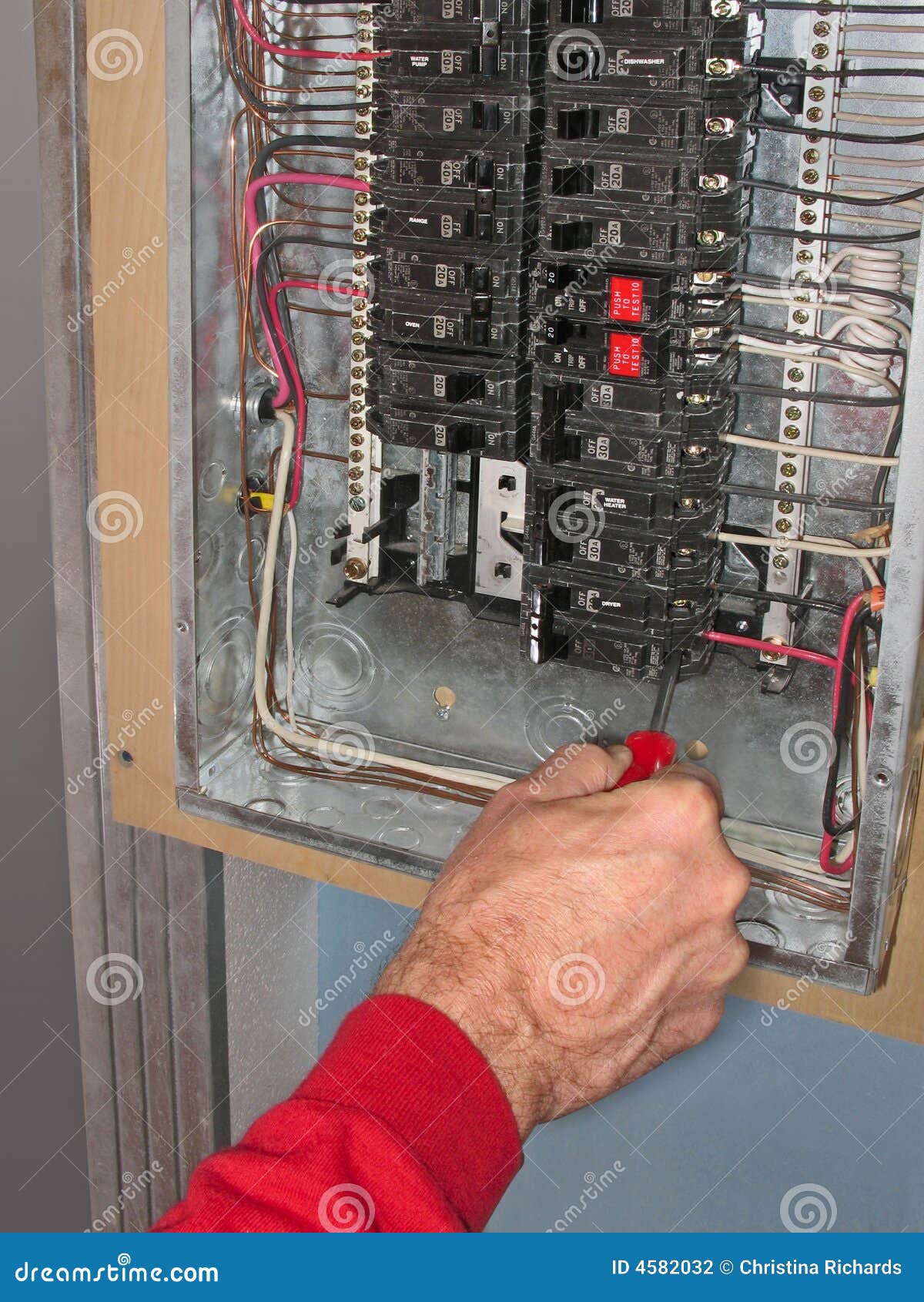 Electrician Make Connections in Panel Box Stock Photo - Image of ...