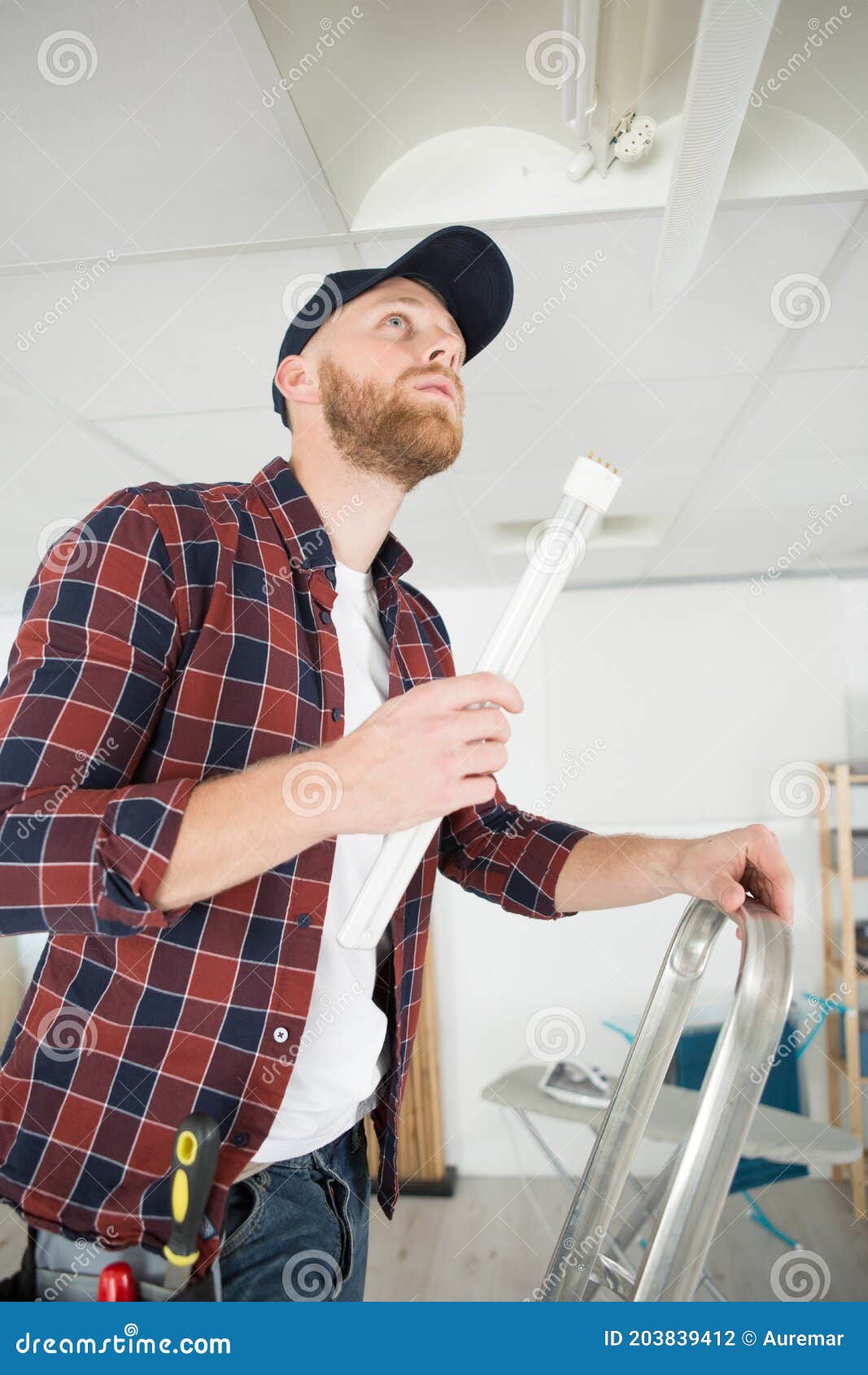 Electrician Man Worker Installing Ceiling Fluorescent in Office Stock ...