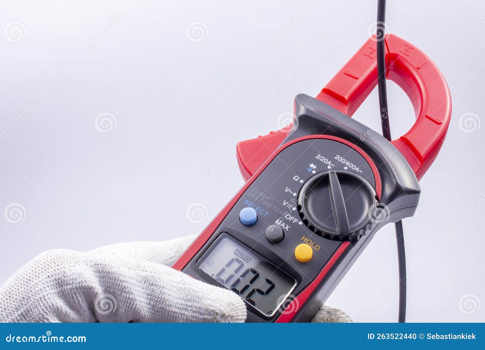 The Electrician Measures the Current in the Phase Wire with a Meter ...